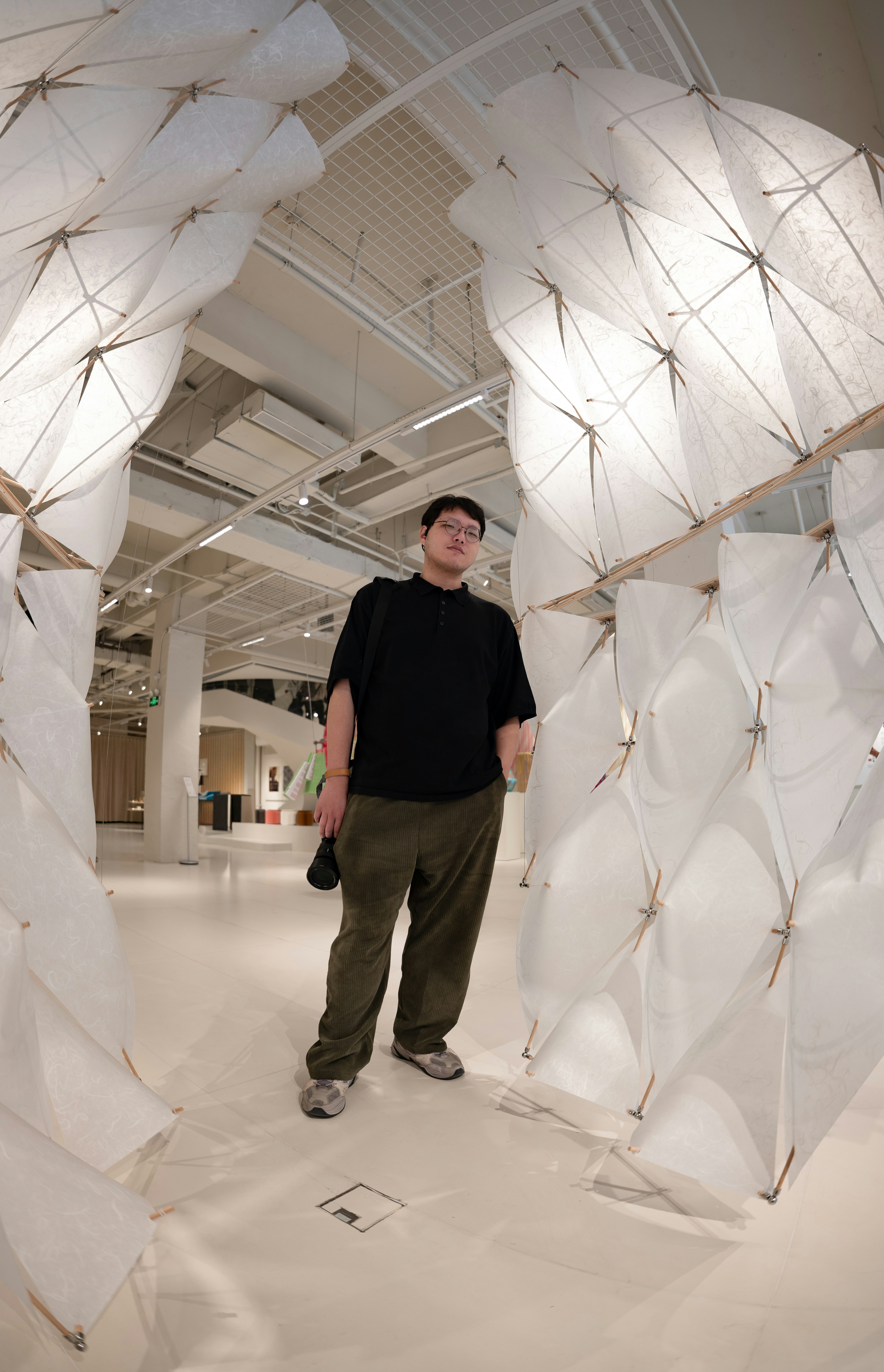 Portrait Between White Sails: A Quiet Study in Fabric Architecture