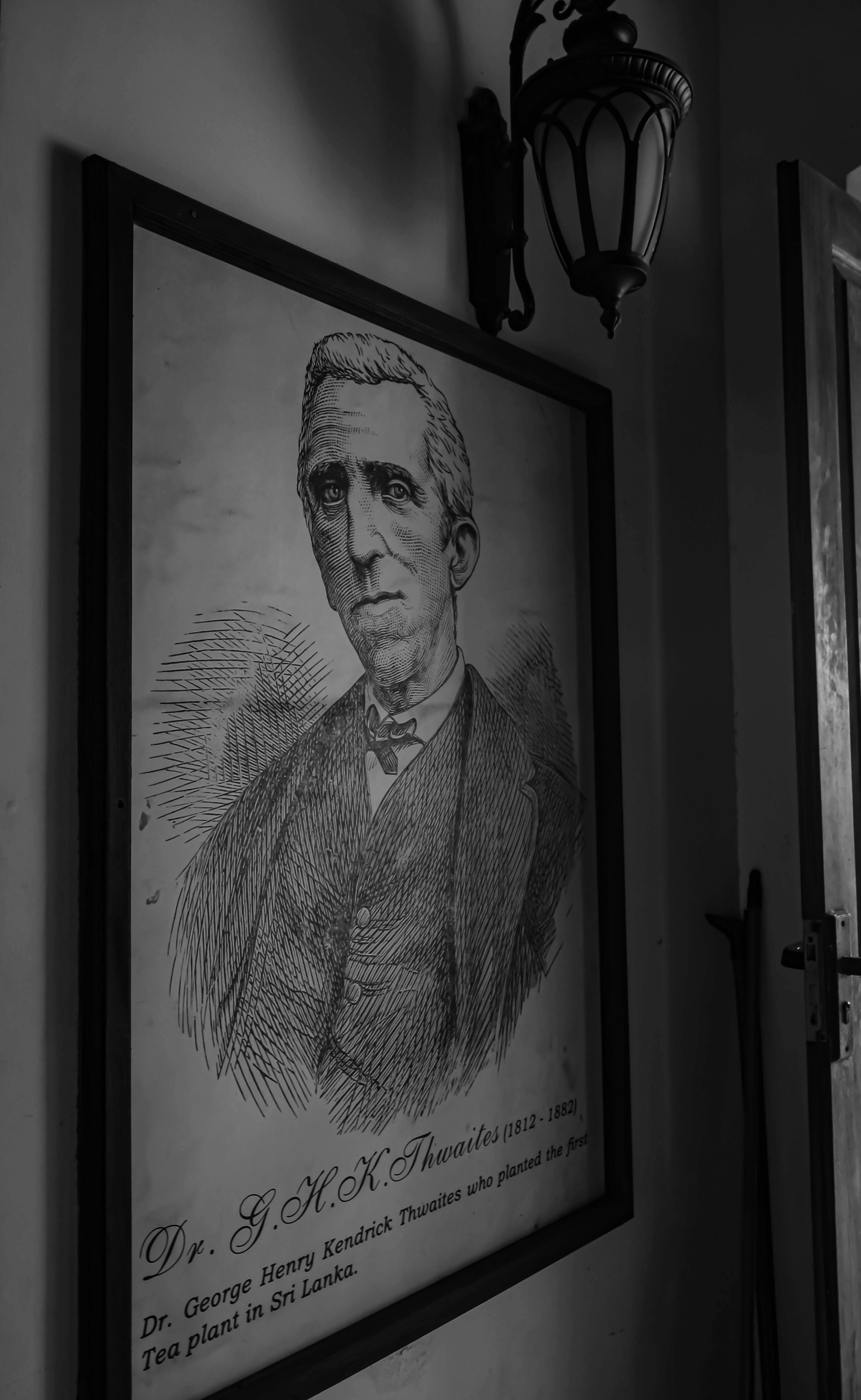 Portrait of dr. george henry kendrick thwaites hangs on a wall. photo ...