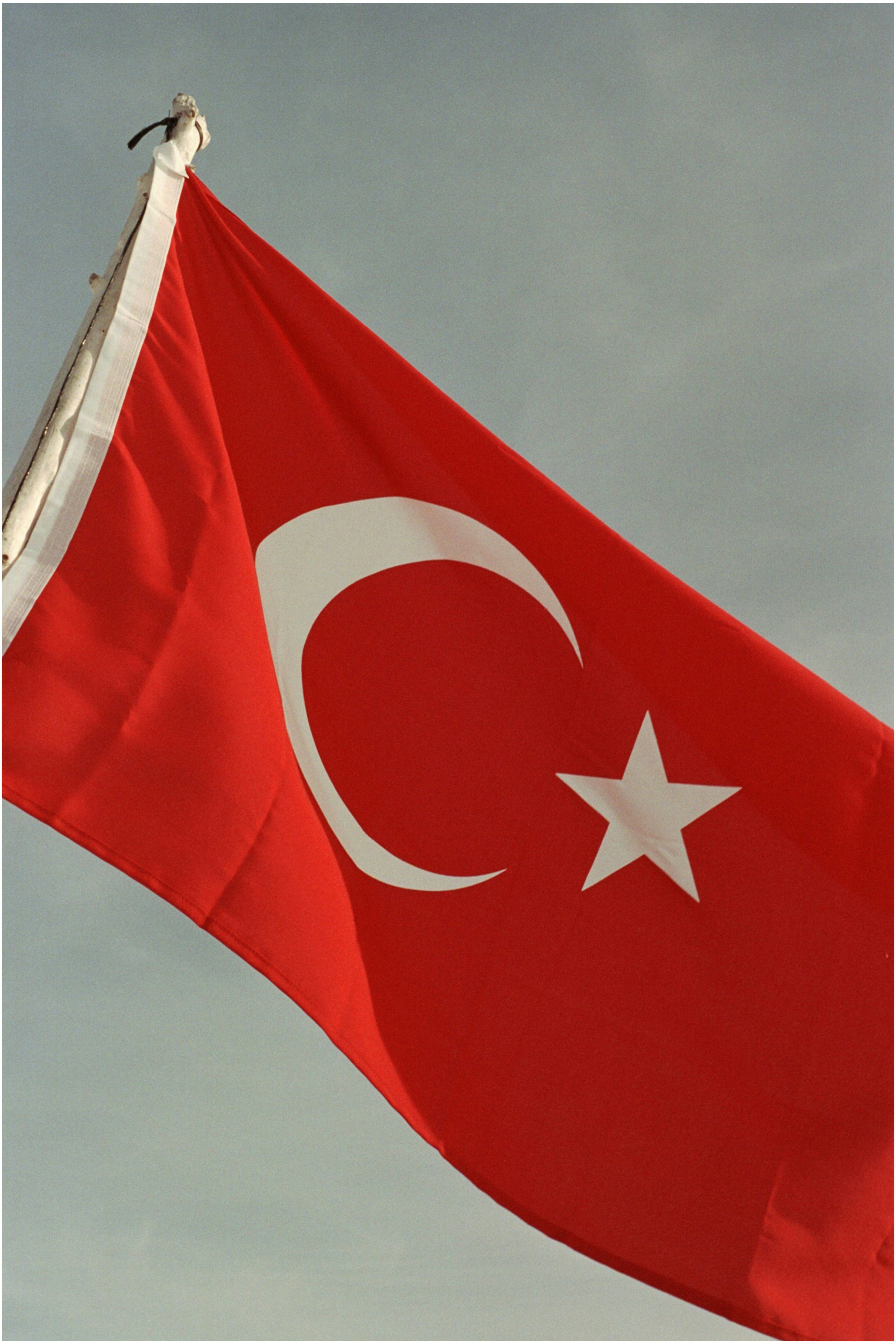 Flag of türkiye (turkey) blown by the wind