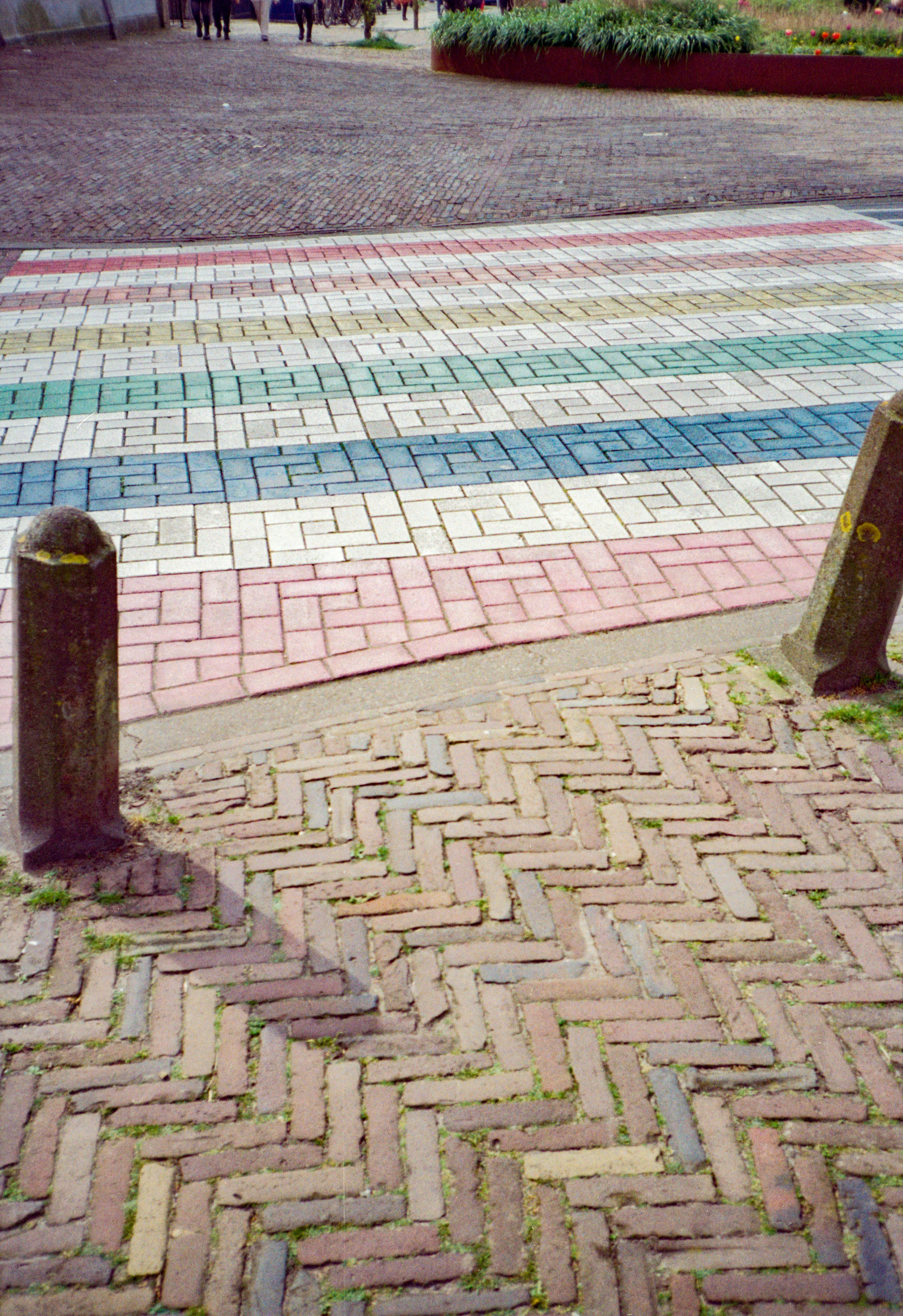 A colorful crosswalk with decorative brickwork. photo – Free City Image ...