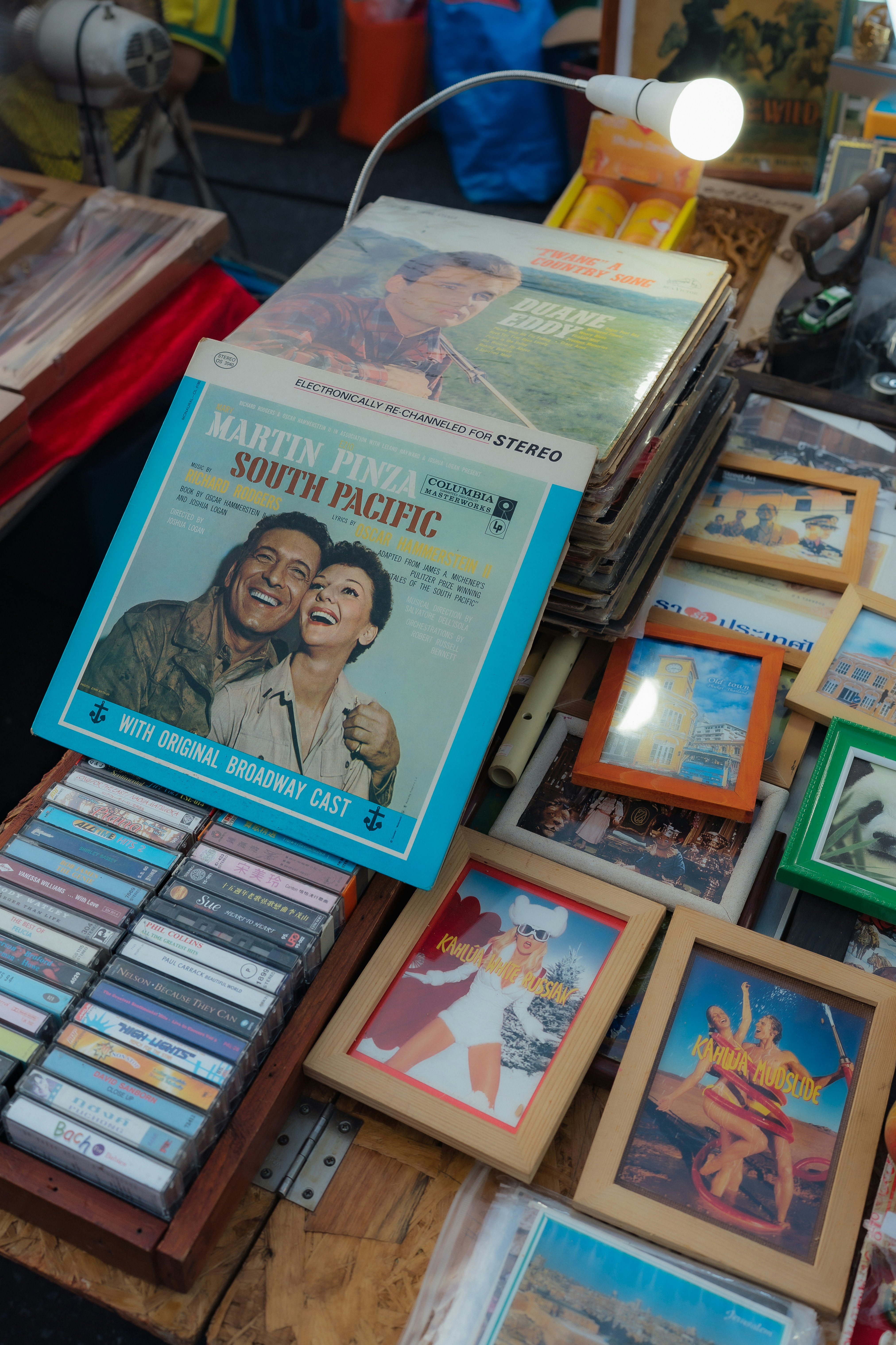 South Pacific Vinyl Spotlight: A Blue Centerpiece at a Bustling Street Stall