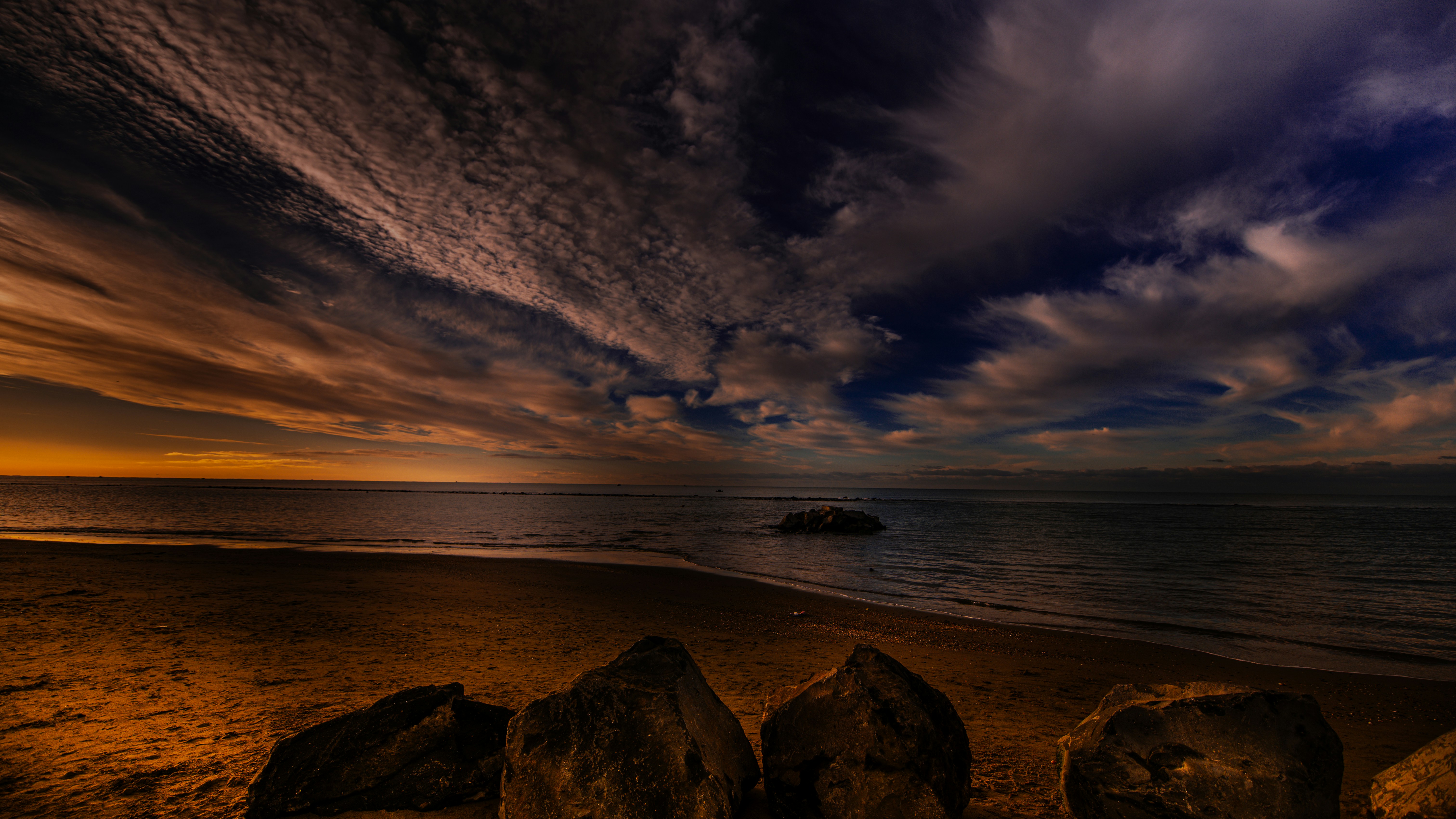 Twilight Drama Over a Tranquil Seascape