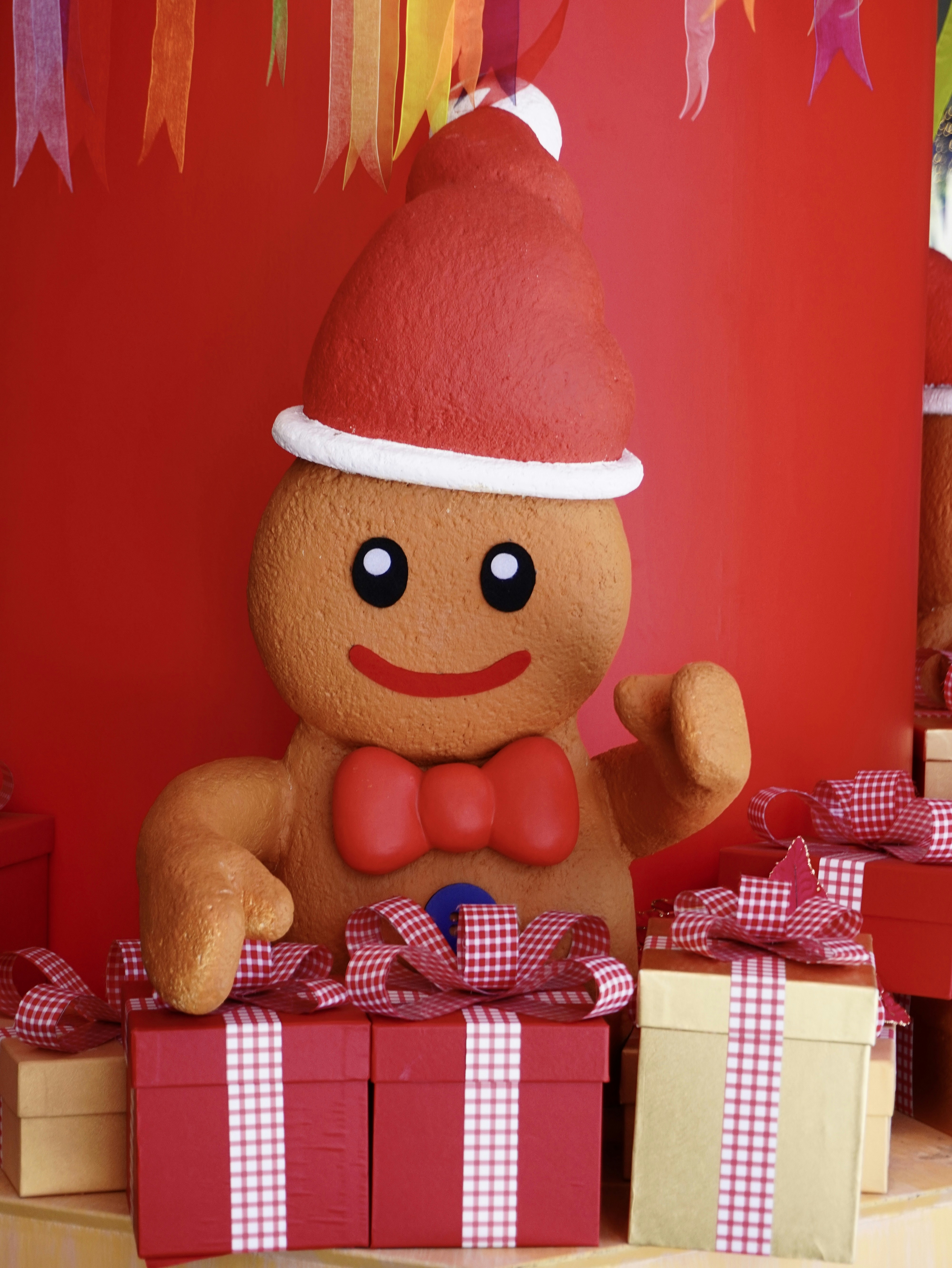 Gingerbread Guardian Amid Festive Gift Pillars