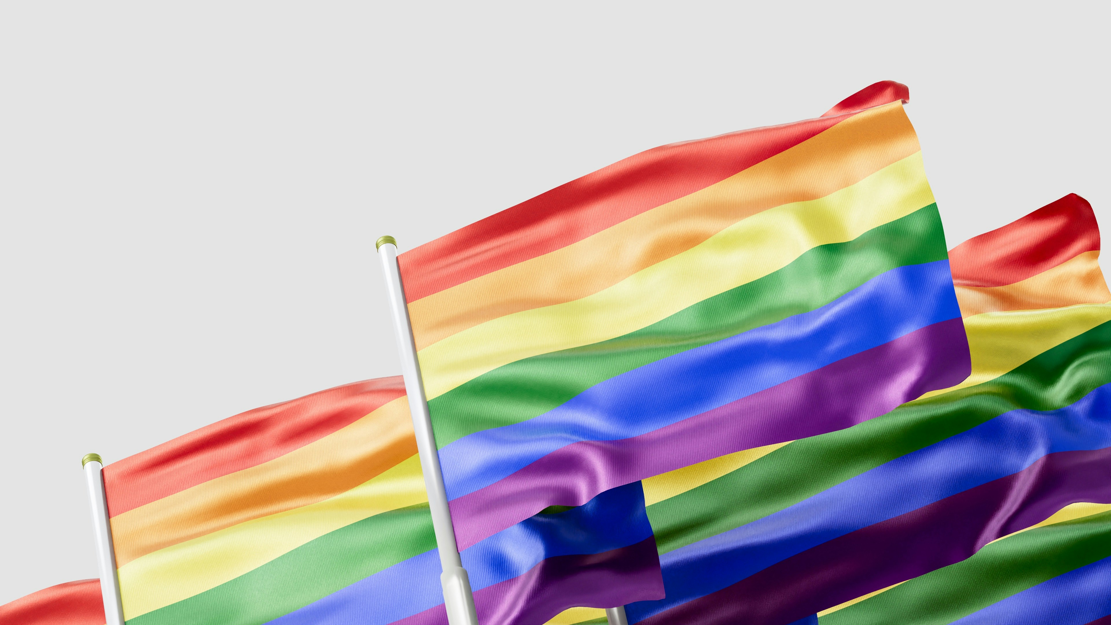 Las banderas del orgullo ondean sobre un fondo blanco. foto – Imagen de ...