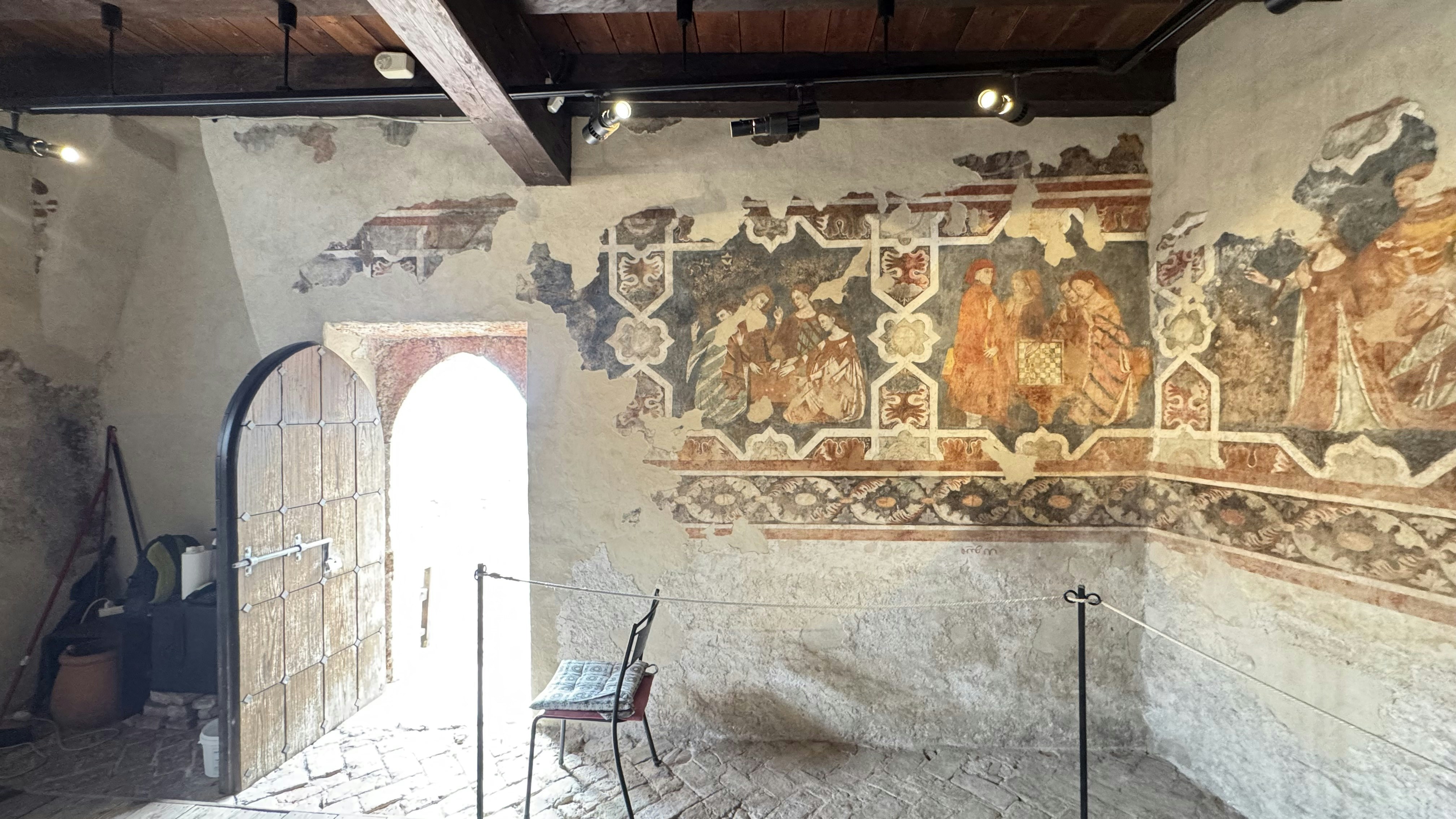 Whispers of History: Frescoes in a Sunlit Alcove