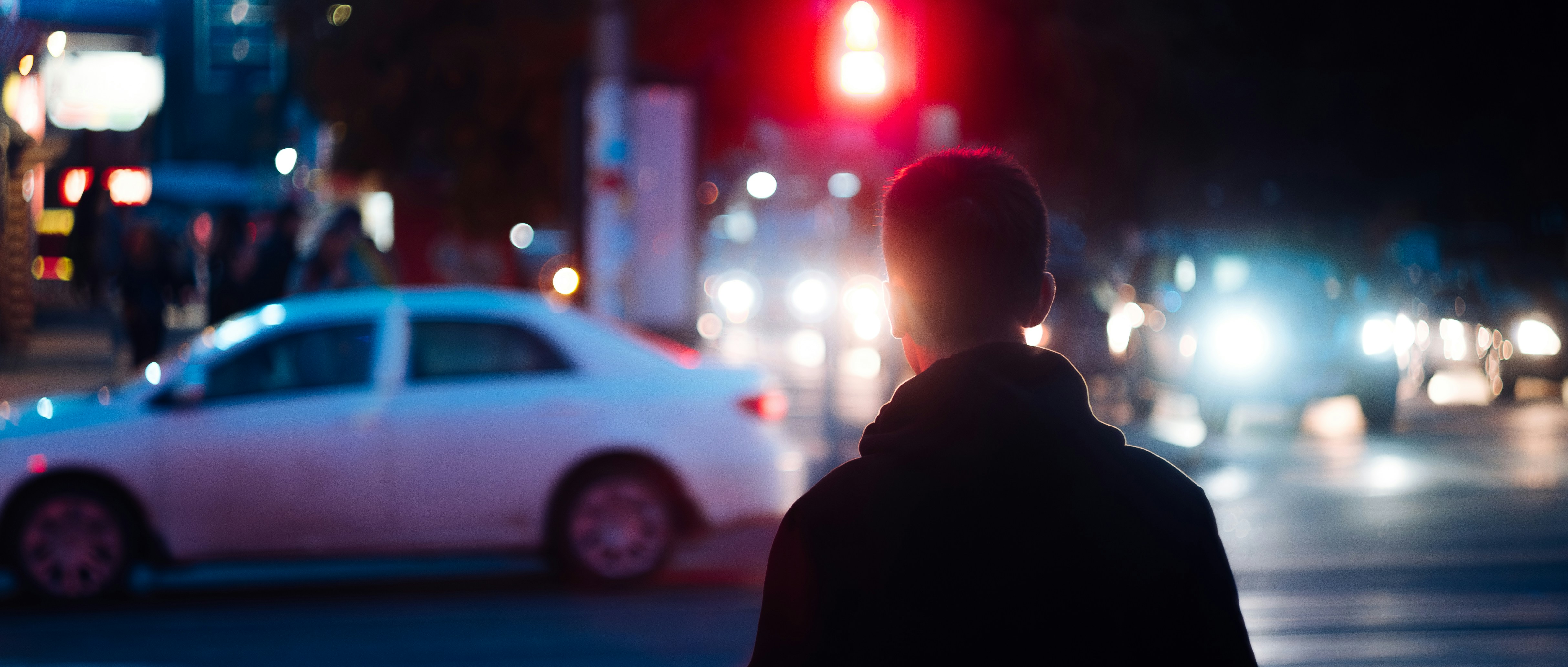 Urban Glow: A Nighttime CrossingVladimir Malyutin