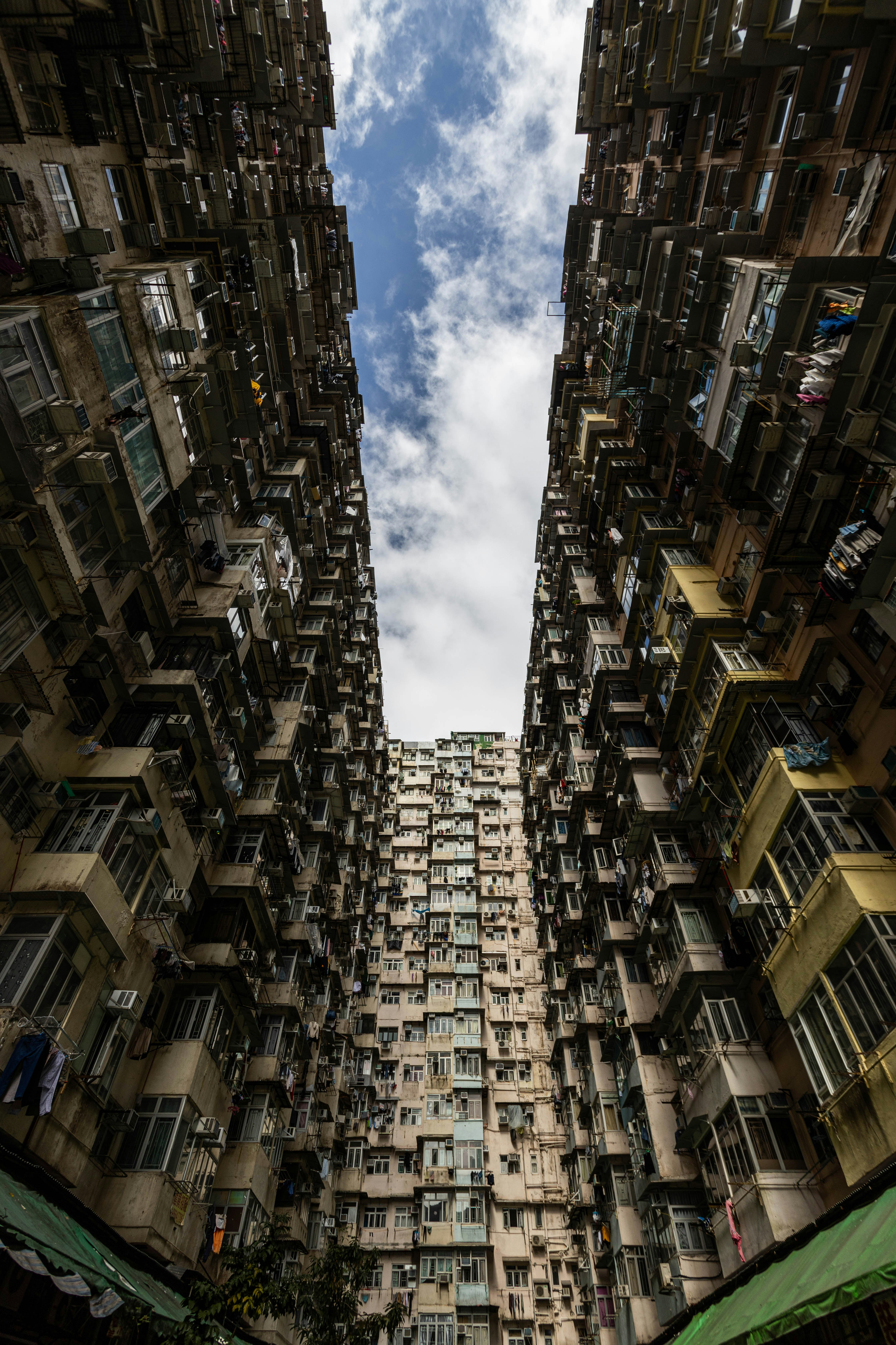 Monster Building in Hong Kong, China | Overwhelmingly tall, densely-packed apartment buildings reach the sky.