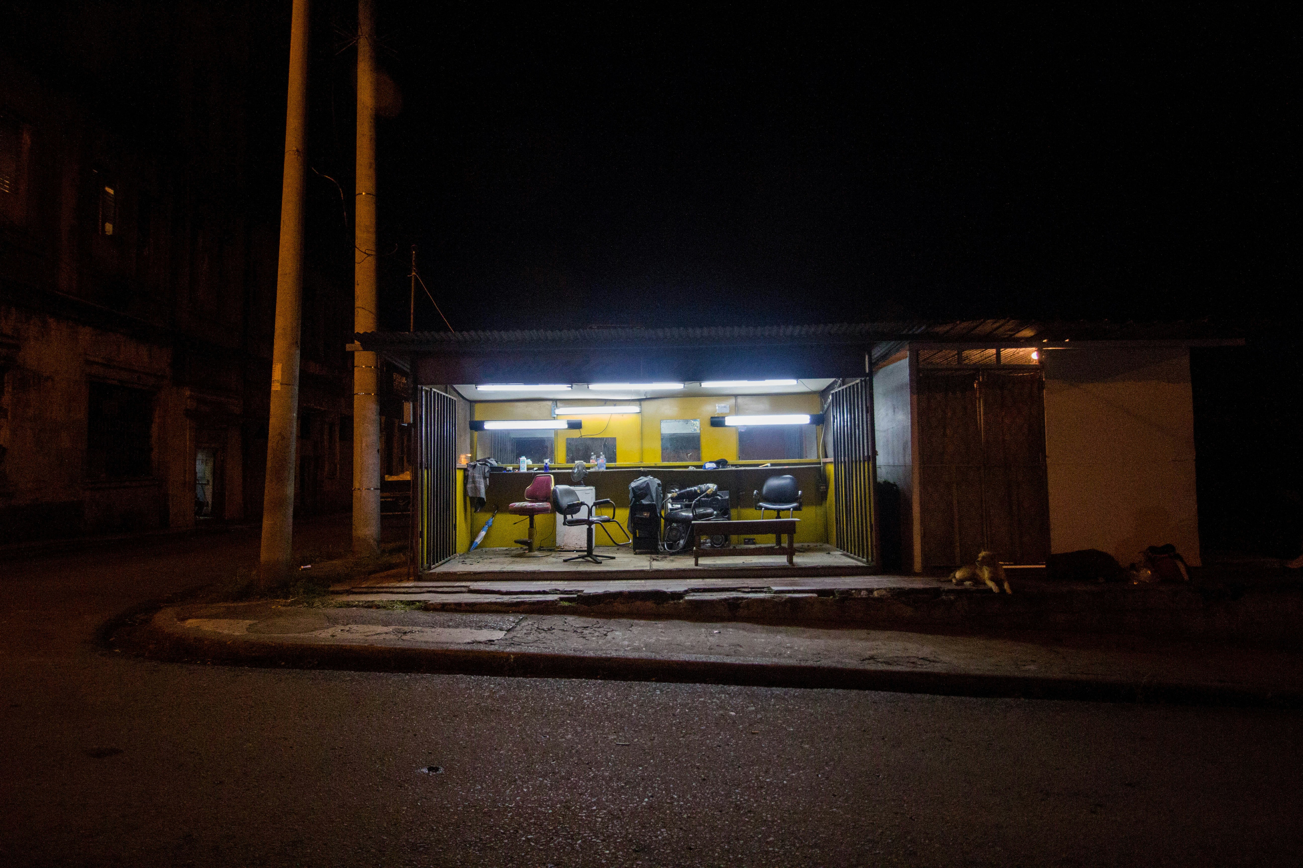 Nighttime Glow of a Panama City Barber Shop