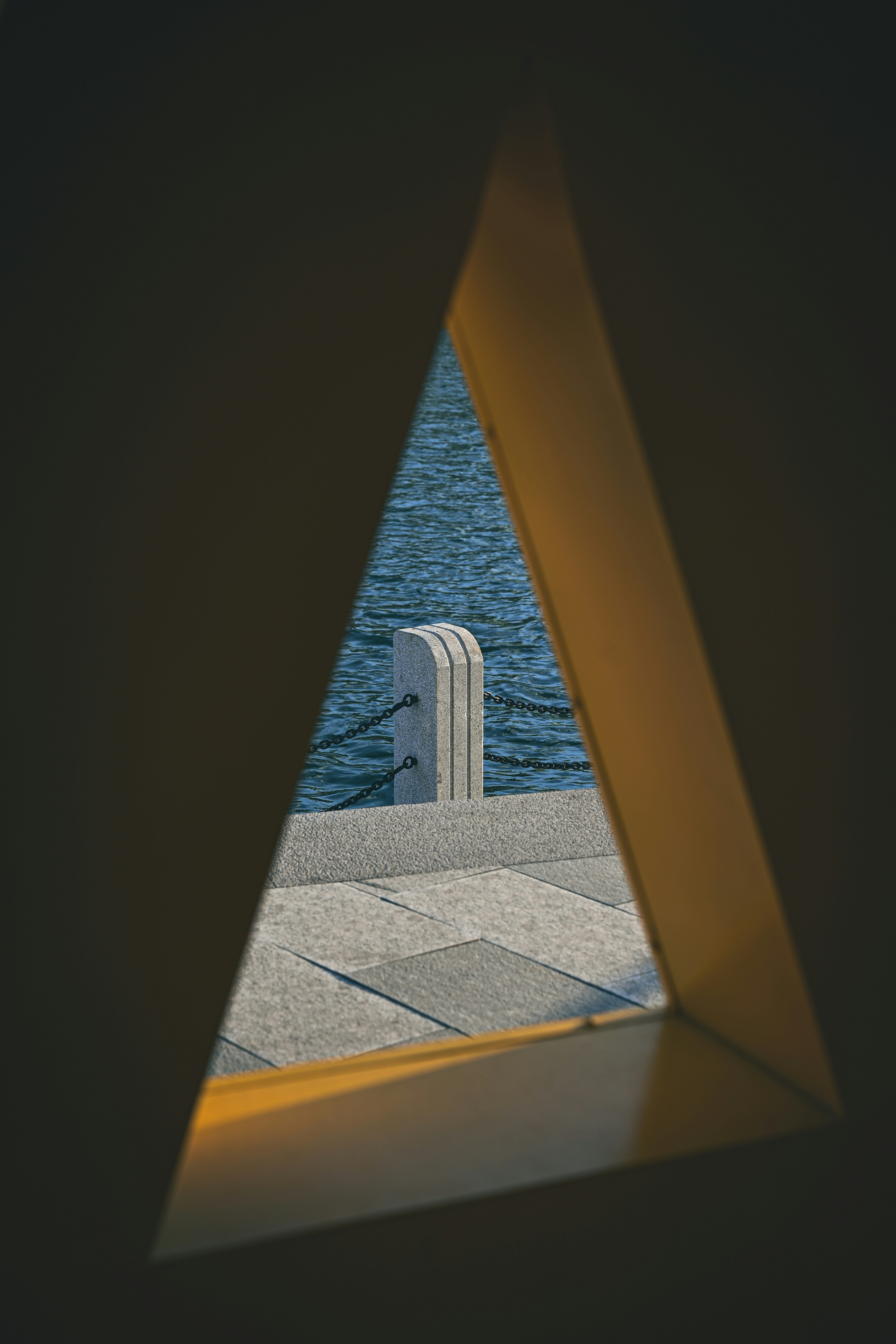 A pier is framed by a triangular opening. photo – Free Wallpaper Image ...