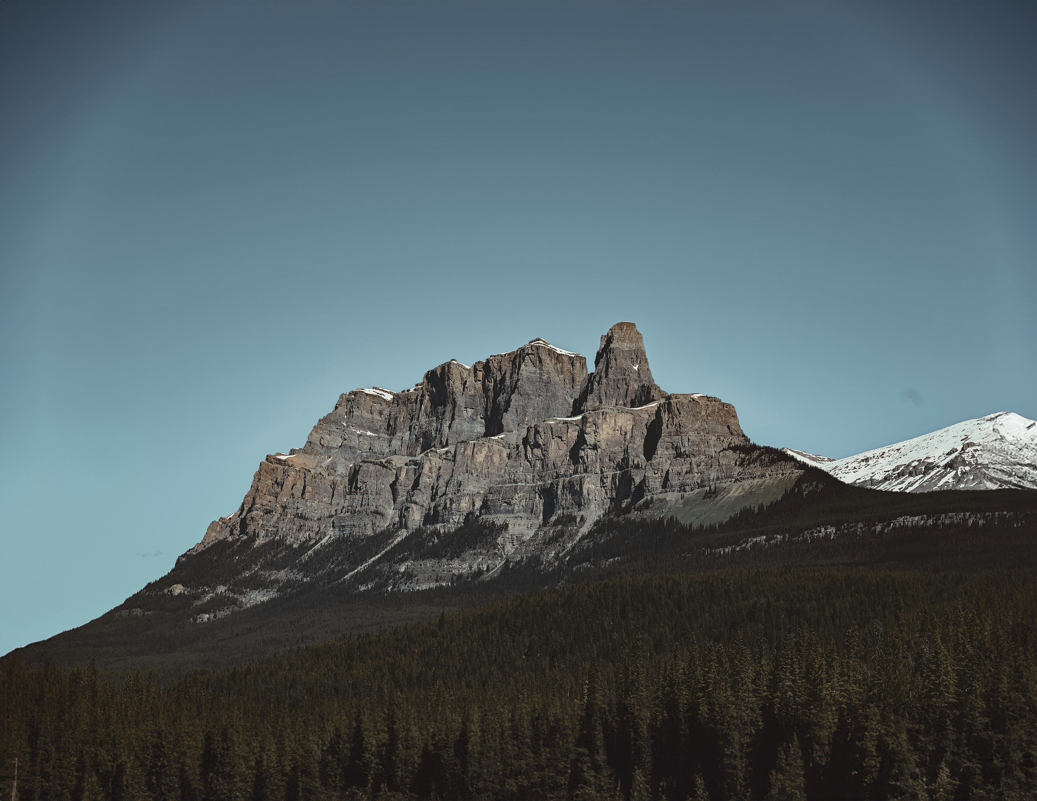 Majestic Peaks Under Clear Skies