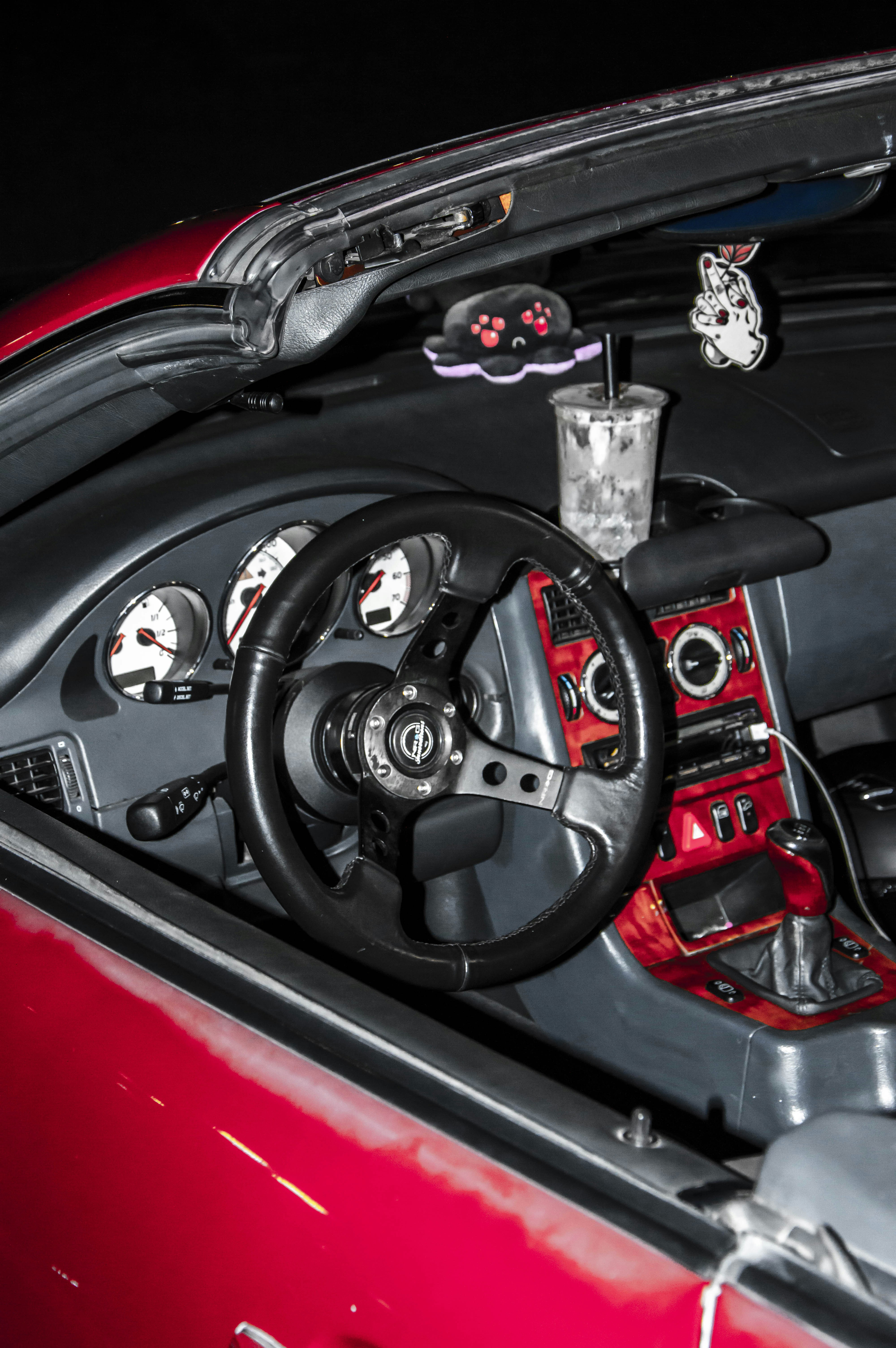 Red Cockpit: A Glimpse into a Personal Car Interior