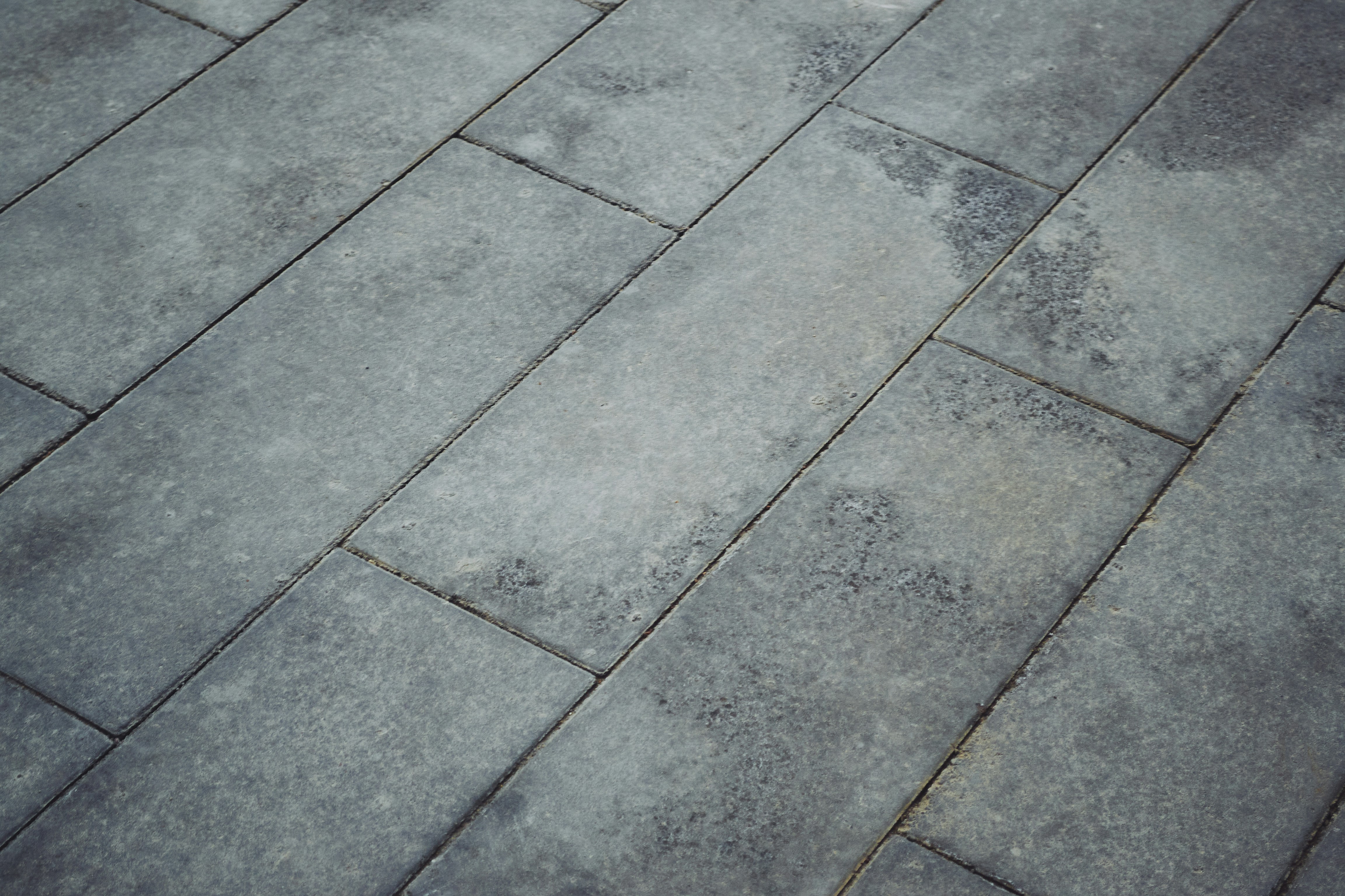 Grey pavement bricks arranged diagonally. photo – Free Grey Image on ...
