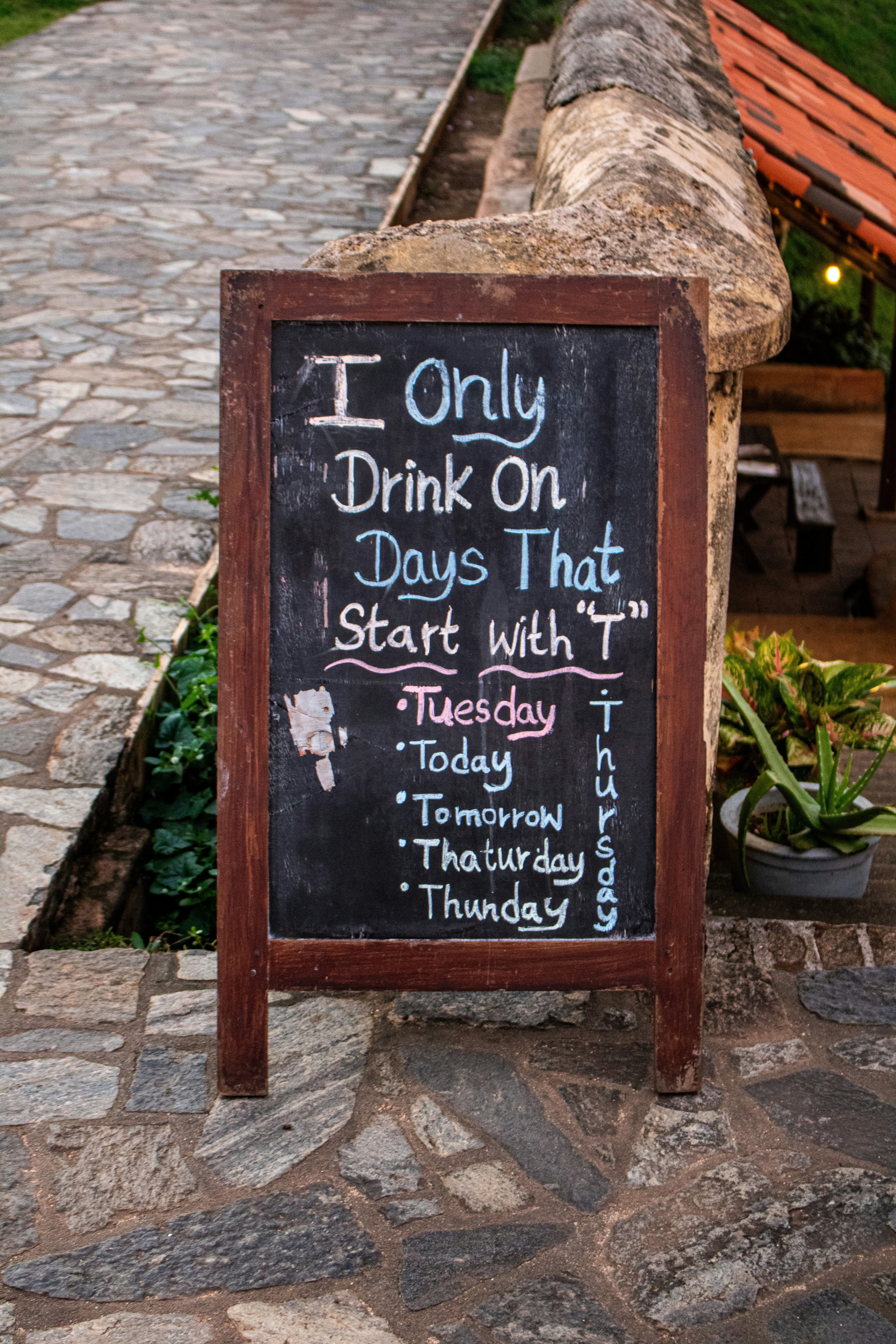 The Quirky Tavern Sign: A Playful Take on Drinking Days