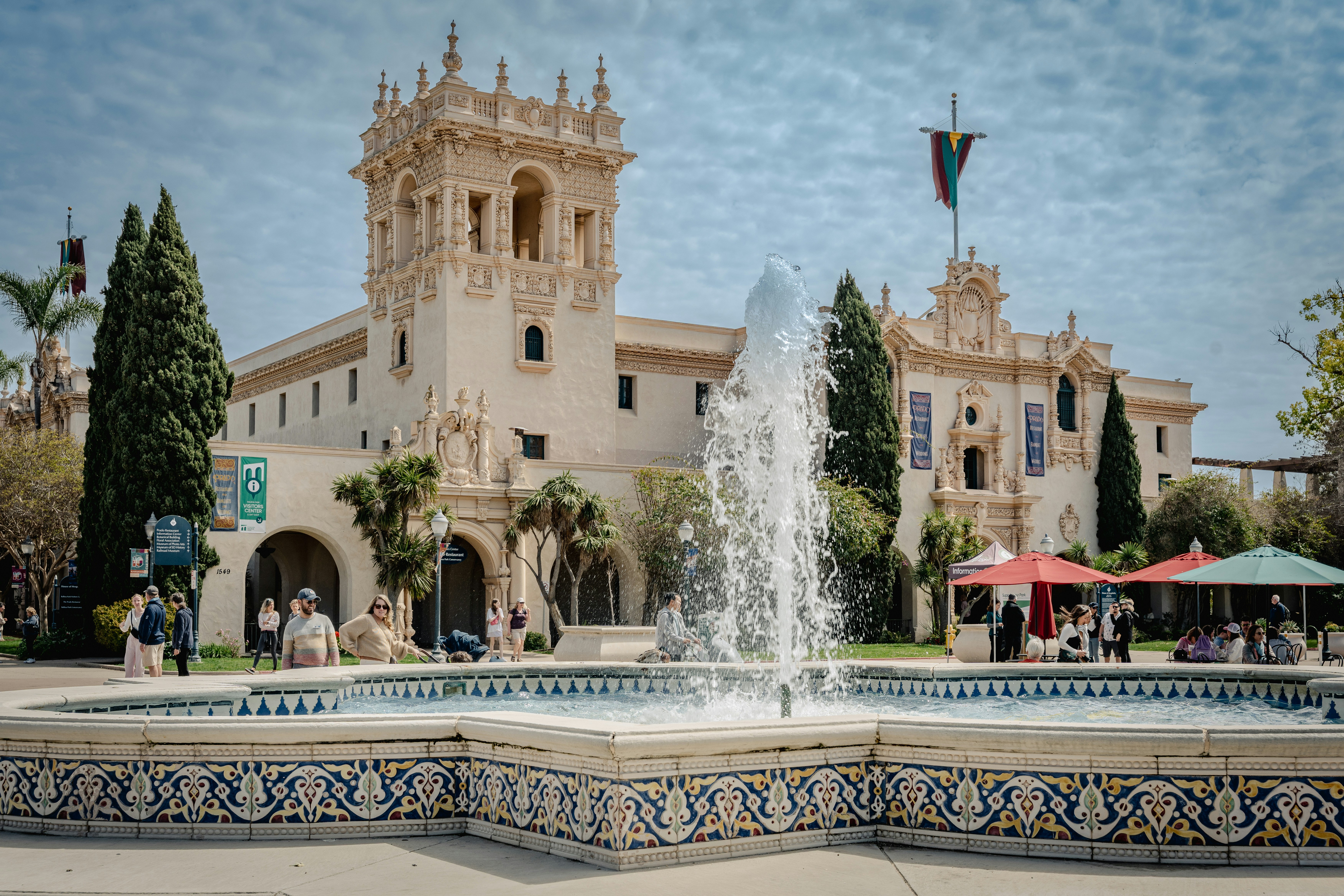 A beautiful fountain stands before a stunning building. photo – Free ...