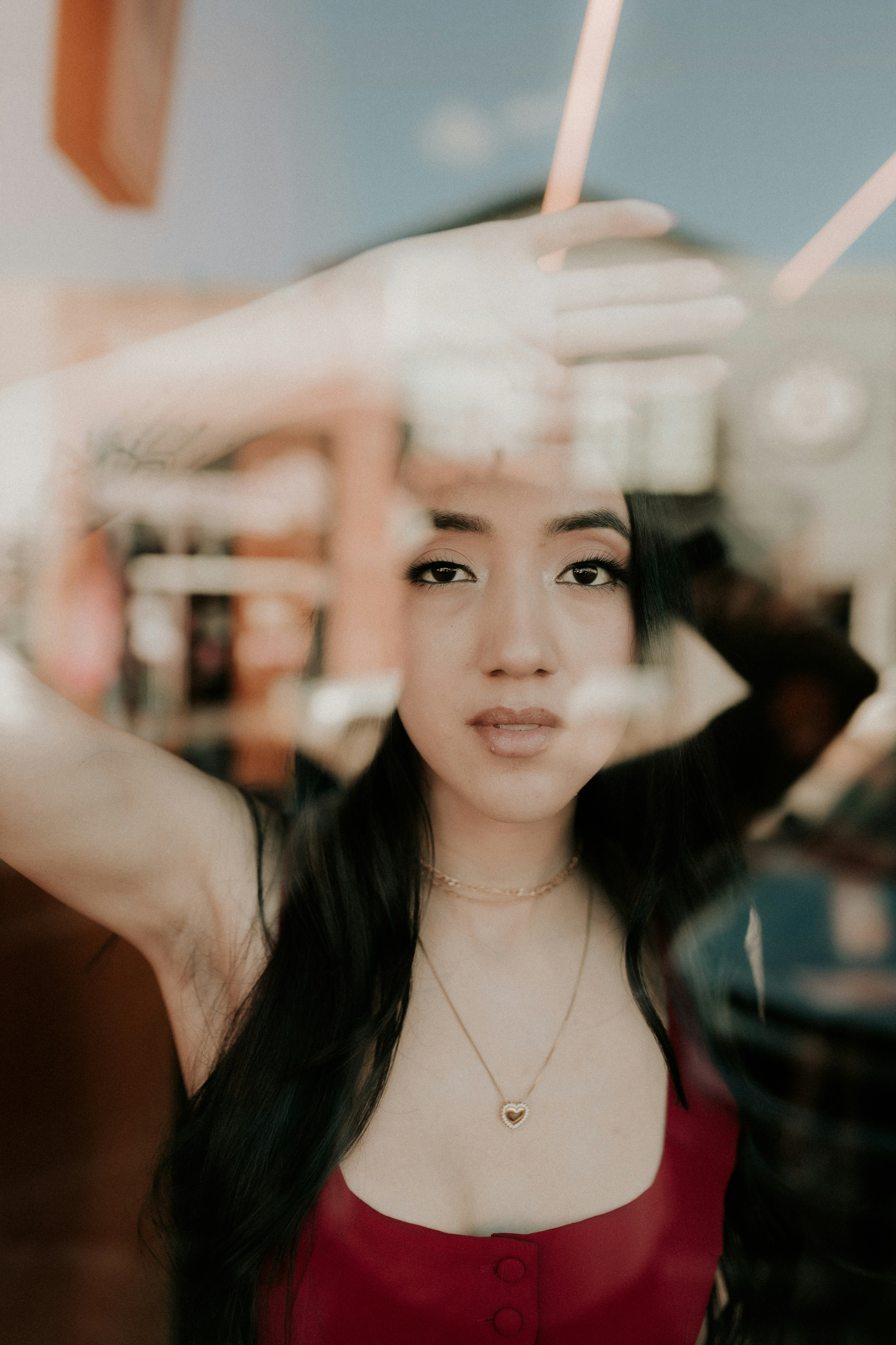 Woman poses behind a window. photo – Free Portrait Image on Unsplash