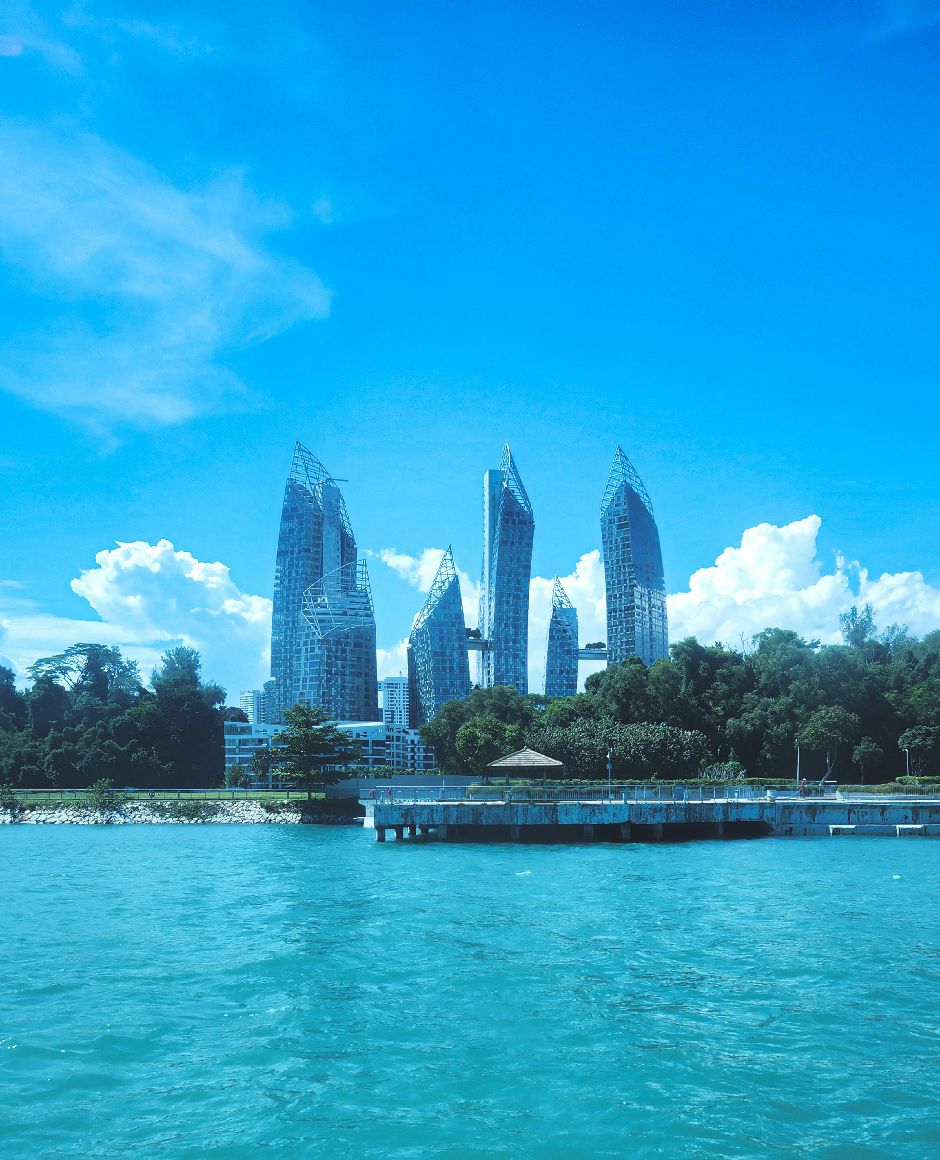 Futuristic Towers Amidst Tropical Serenity