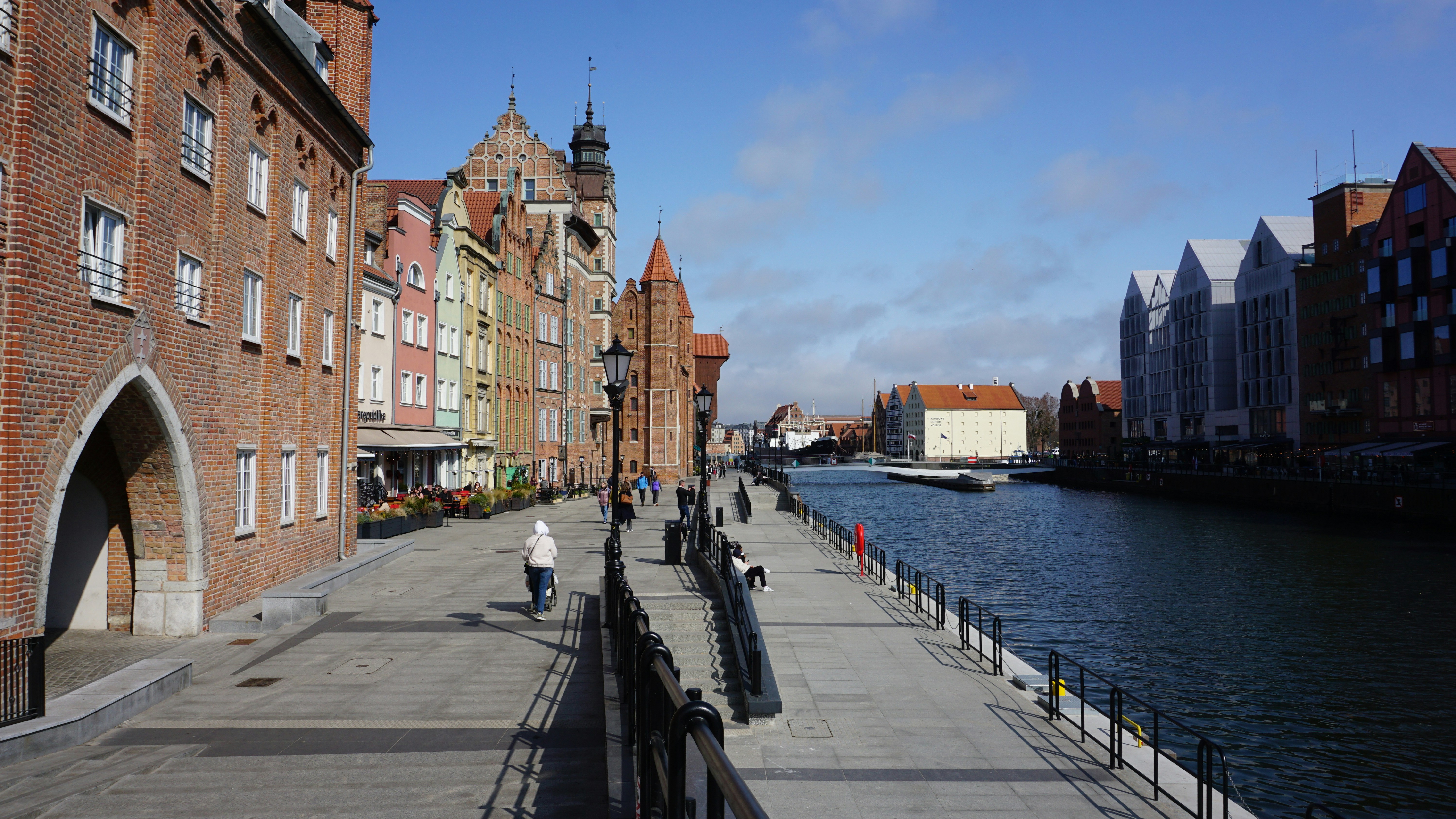 Scenic buildings line a waterfront promenade. photo – Free City Image ...