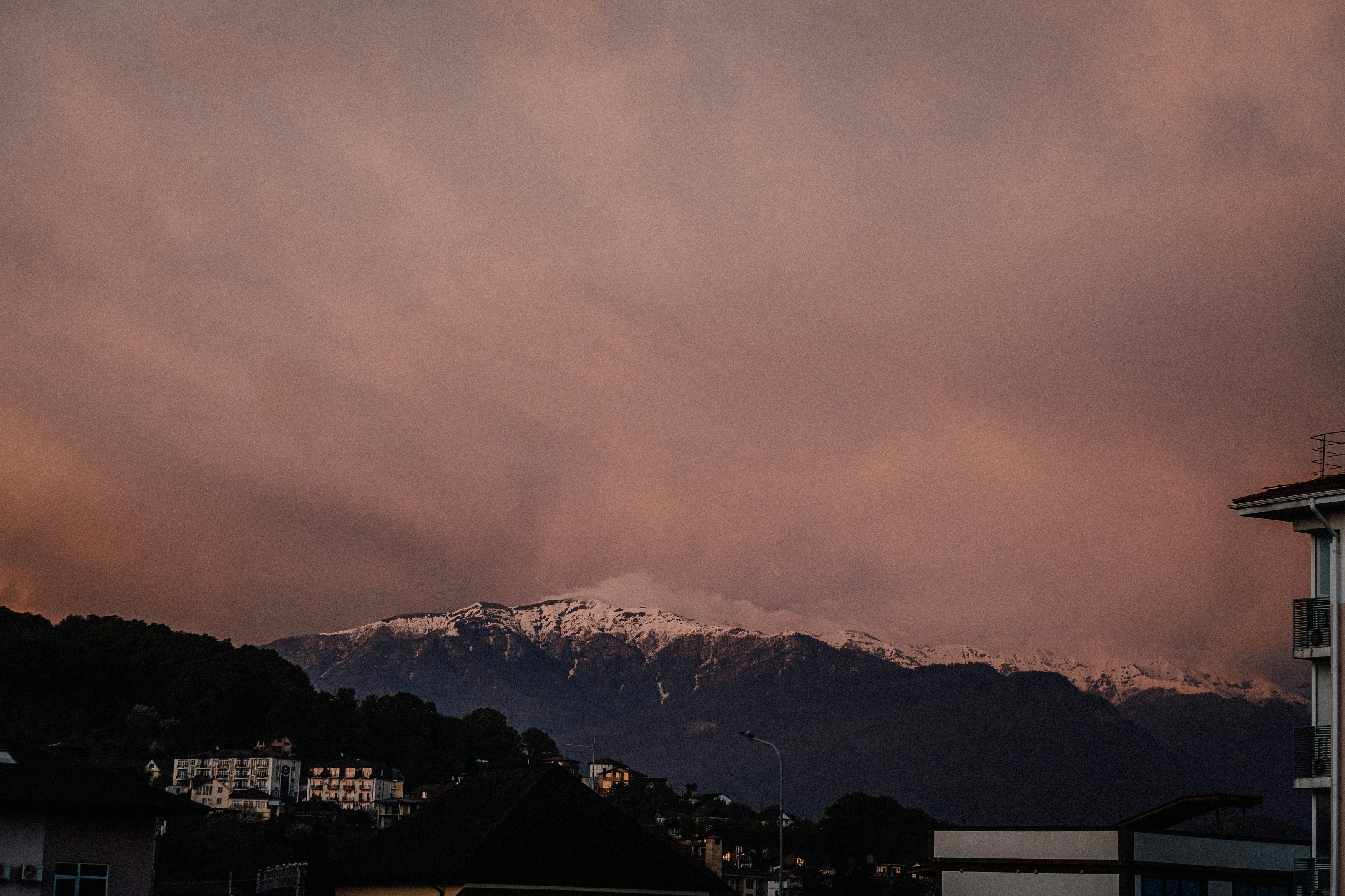 Twilight Ridge Overlook: Snow-Capped Peaks Beneath a Rosy Sky