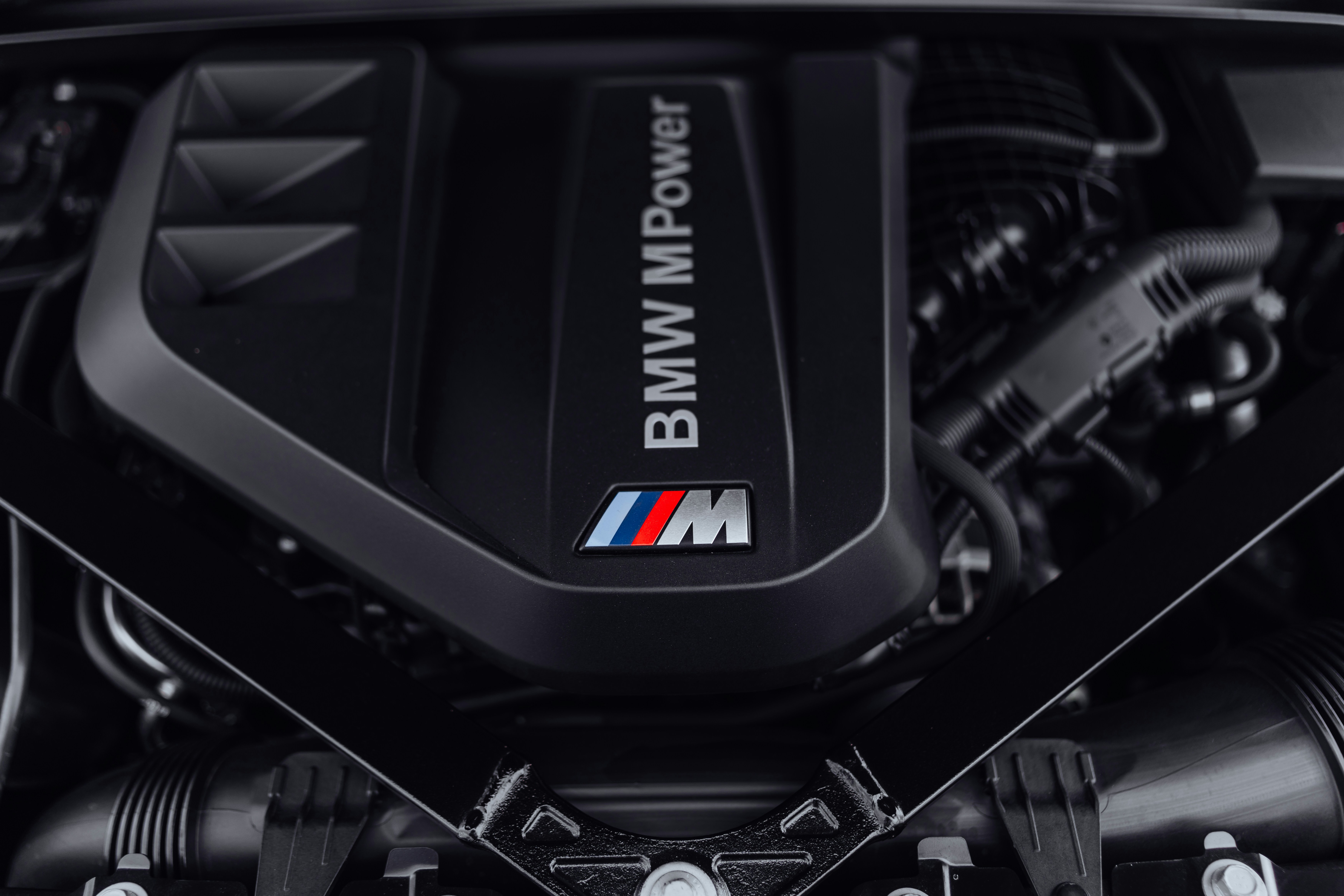A BMW m power engine is shown. photo – Free Car Image on Unsplash