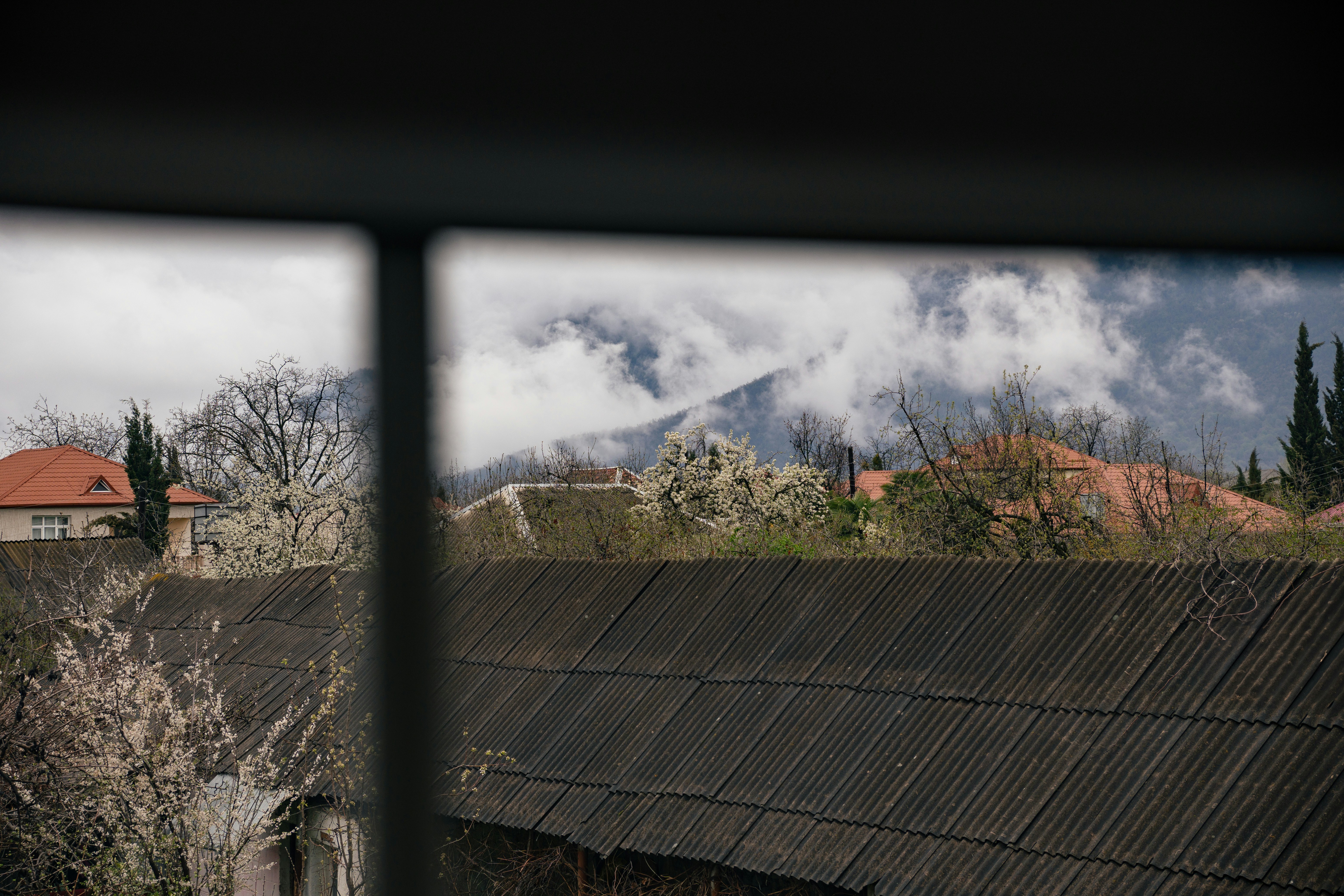 Framed Vista of Rustic Rooftops
