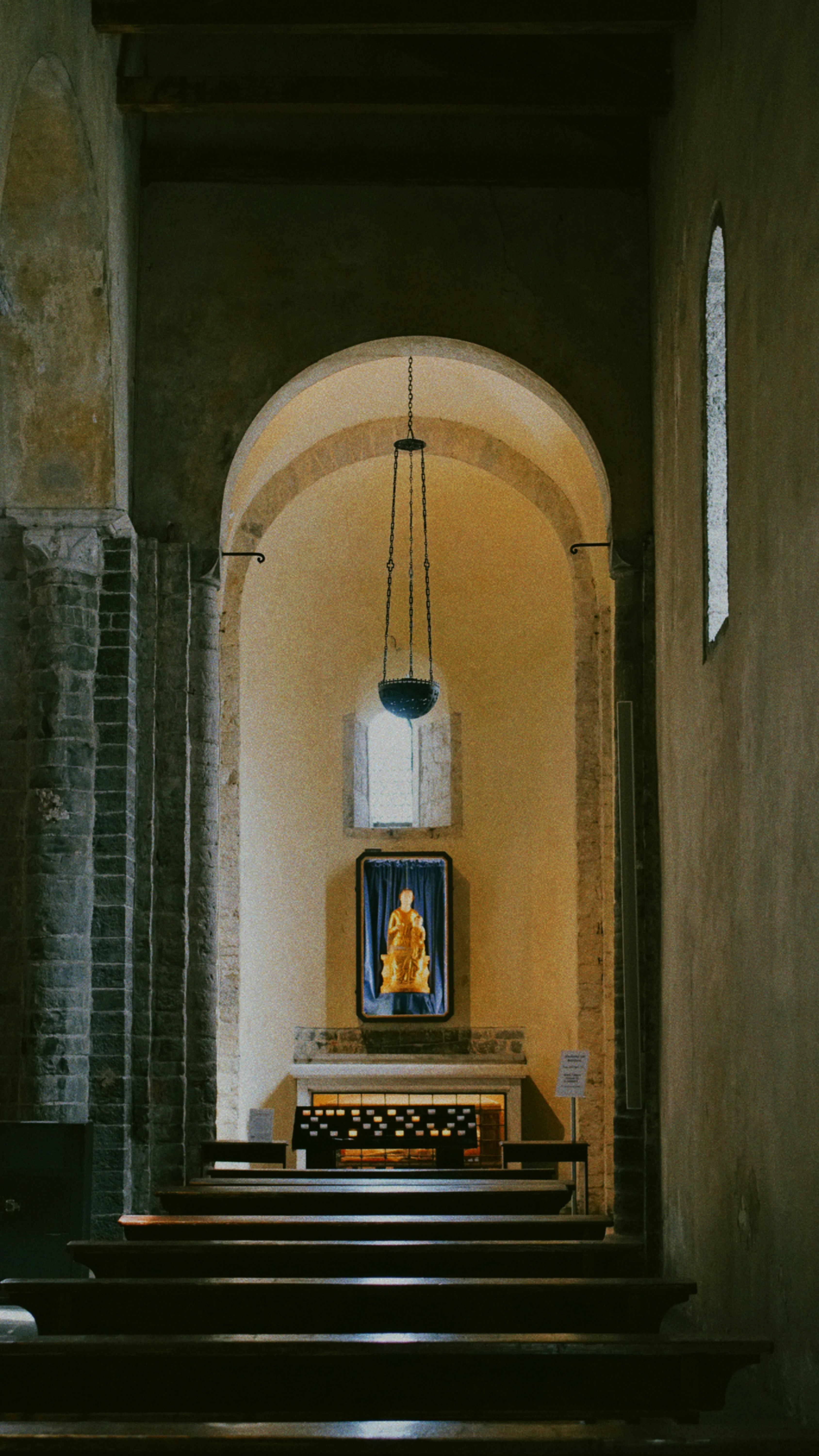 A religious shrine is lit inside a church. photo – Free Building Image ...