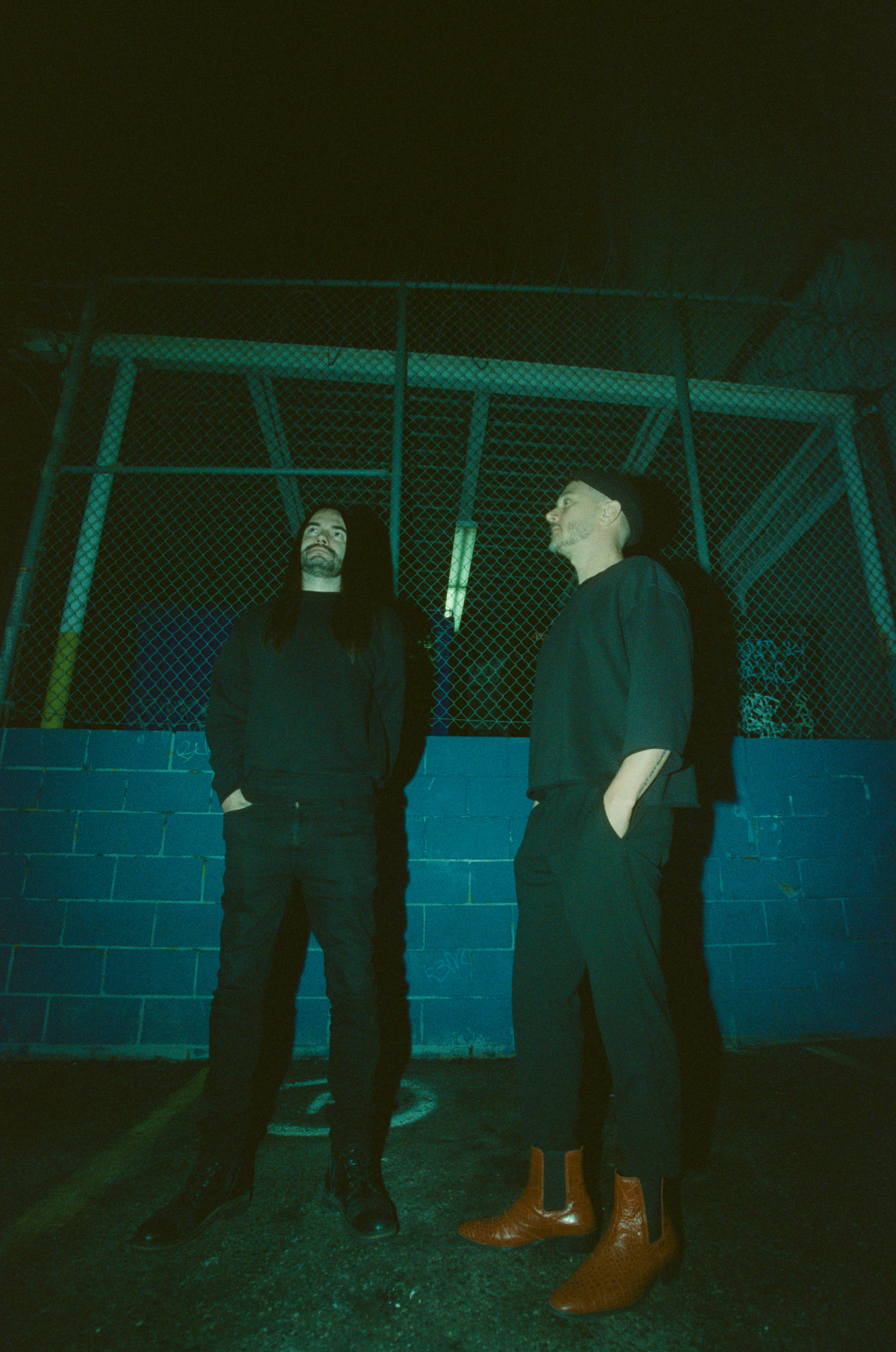 Two people stand outside at night. photo – Free Los angeles Image on ...