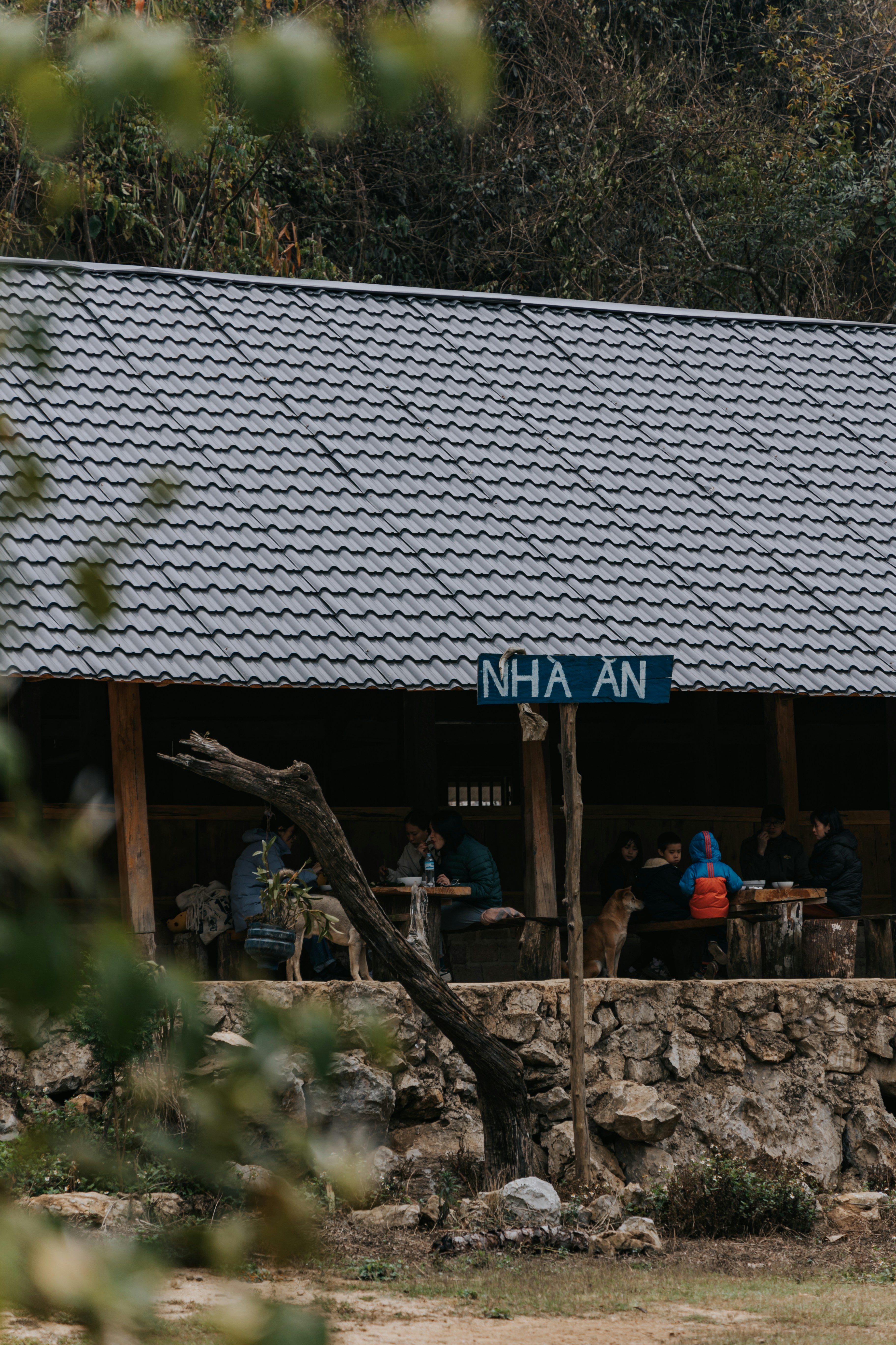 Nha An Terrace: Dining Beneath a Weathered Tile Roof
