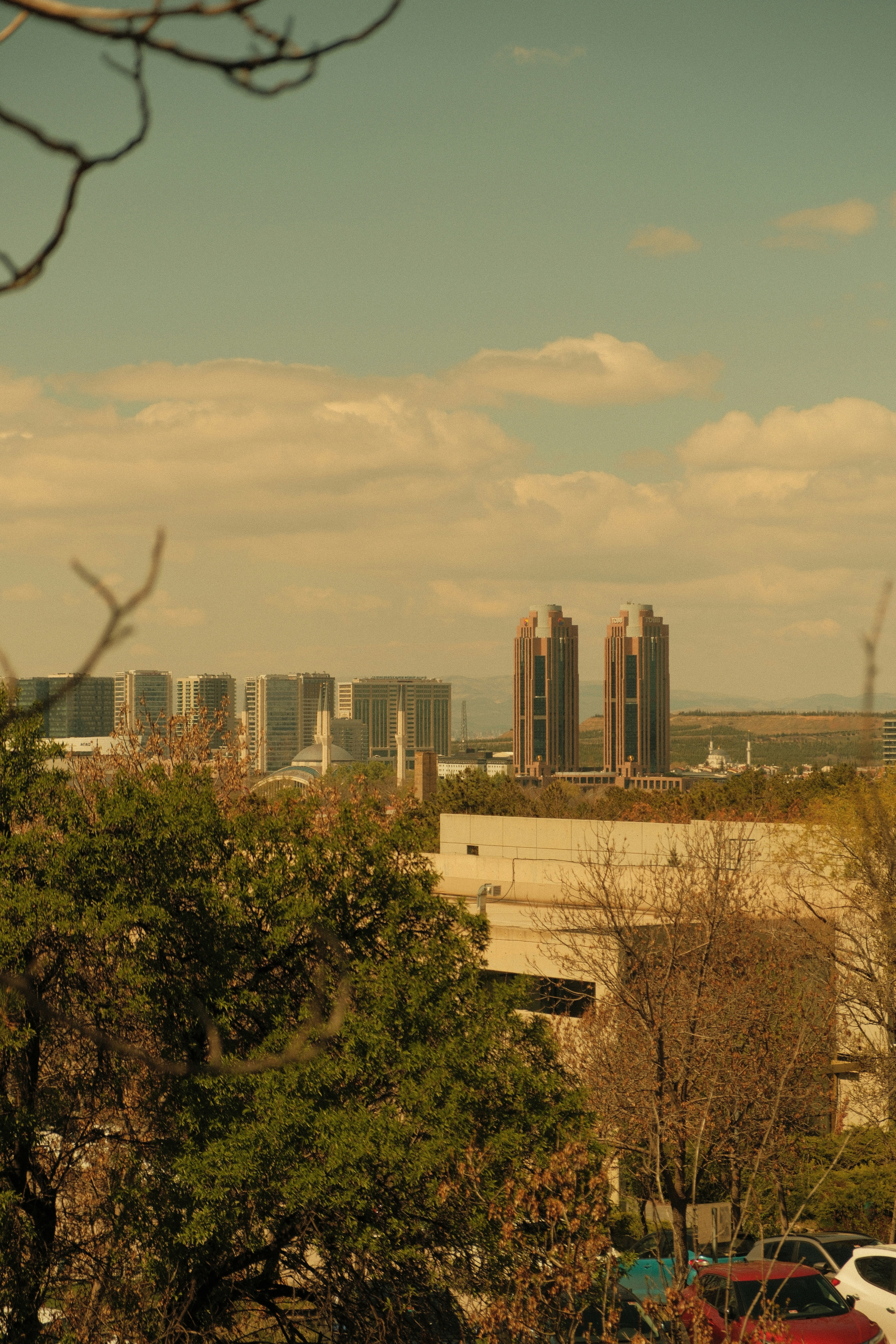 Amber Hour Ascendants: Twin Towers Framing a Calm Cityscape