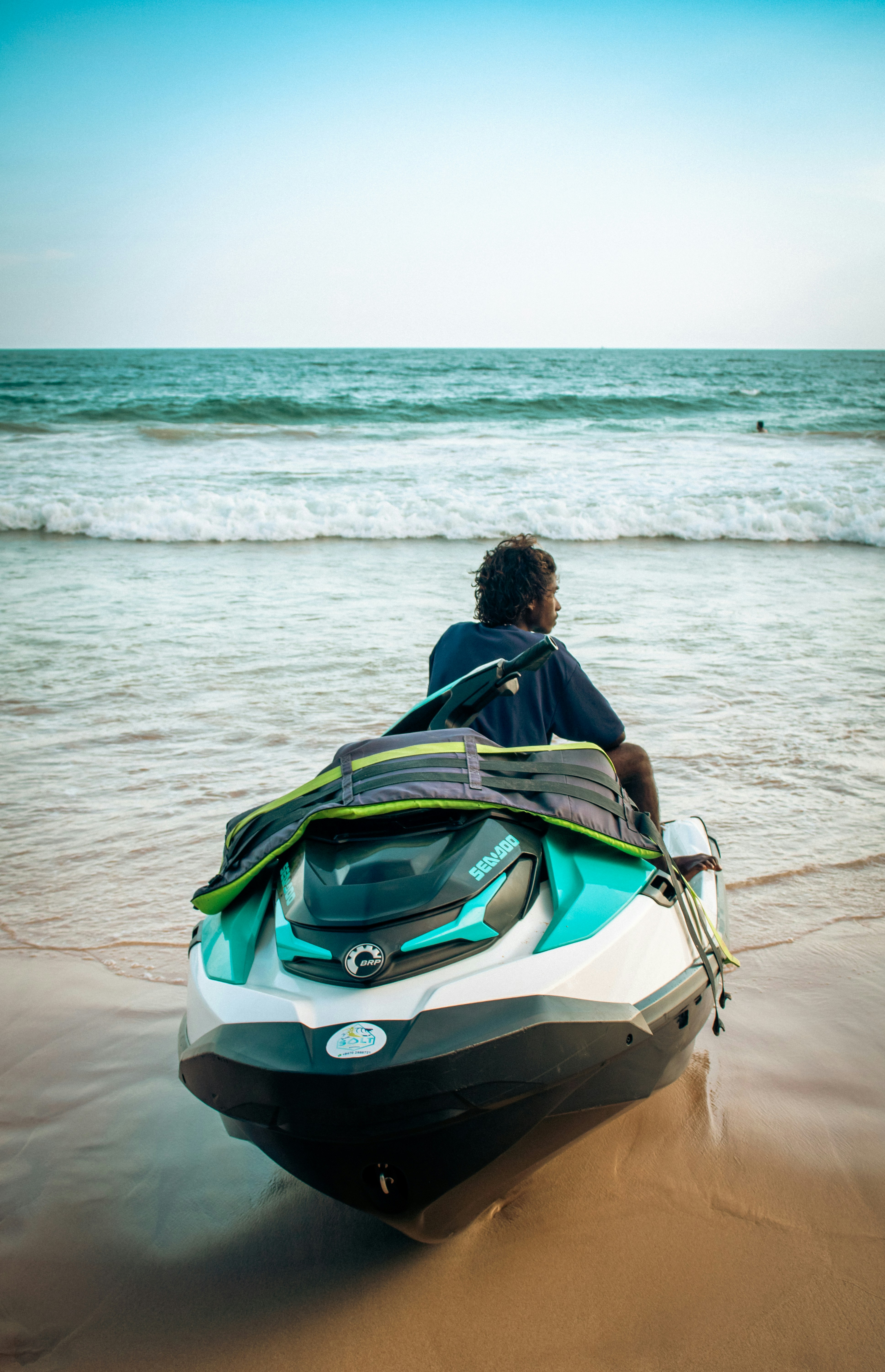 Teal Wave Rider on a Quiet Shore