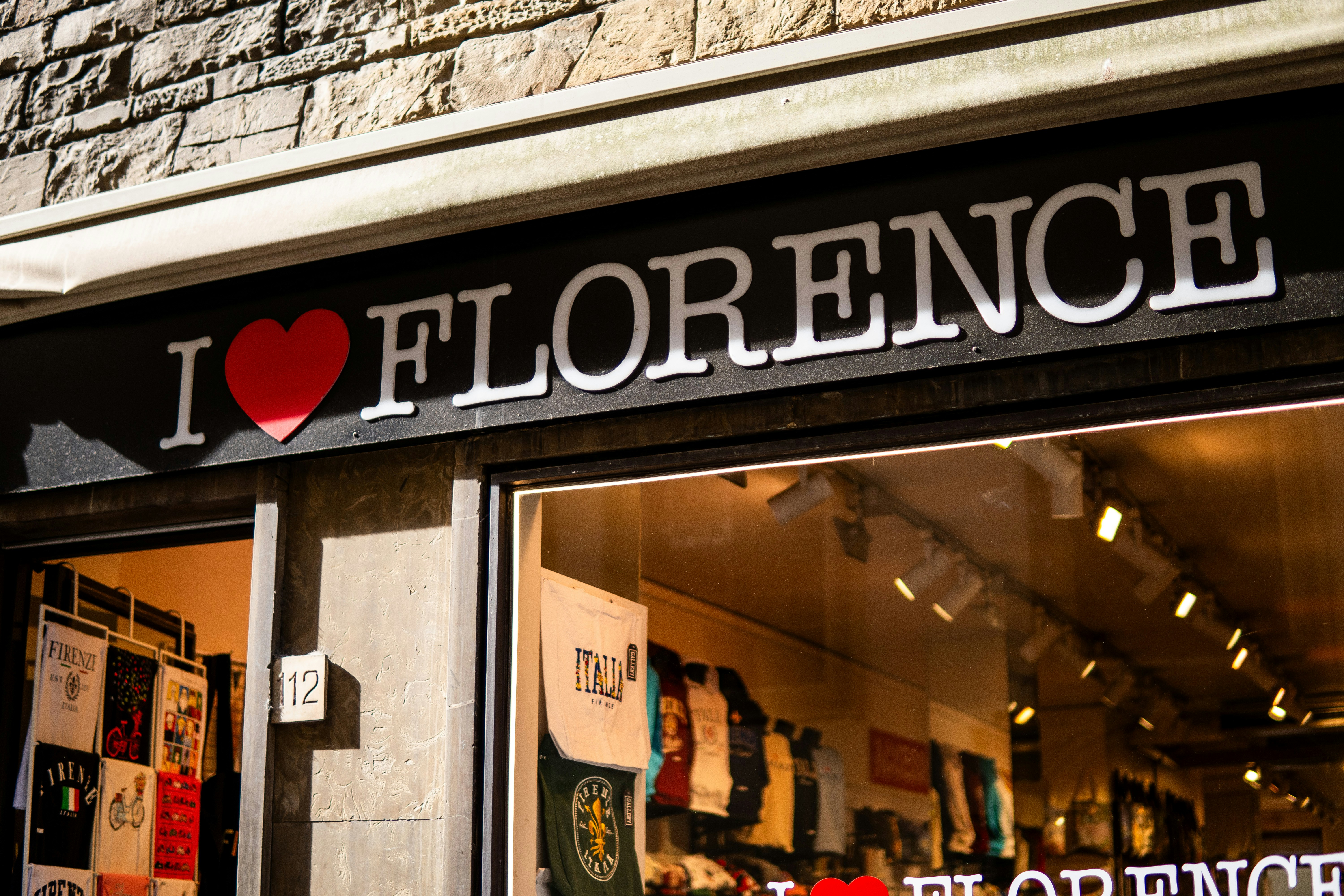 The store sign says "i ️ florence." photo – Free Love background Image ...