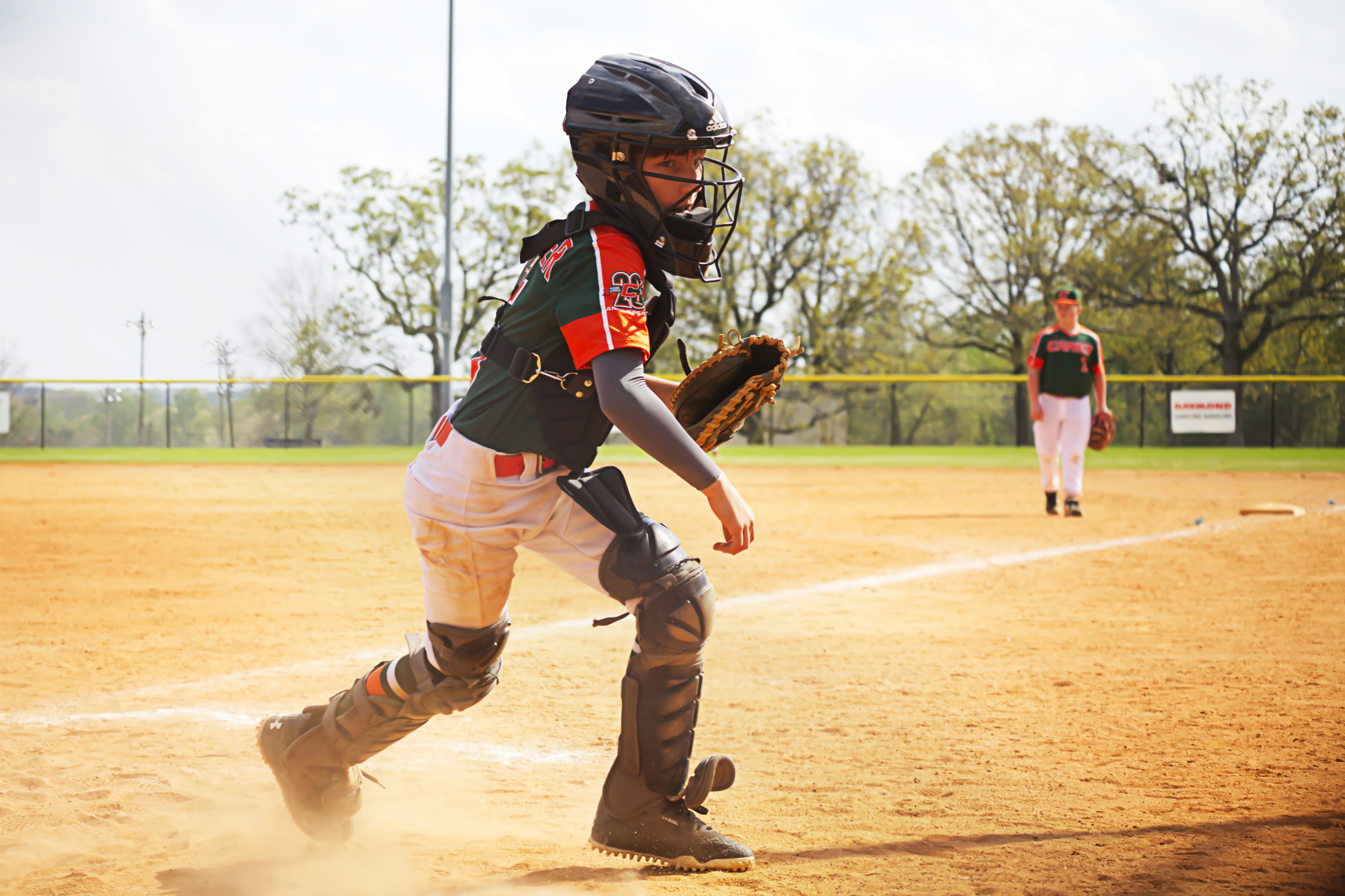 A baseball catcher is ready to make a play. photo – Free Human Image on ...