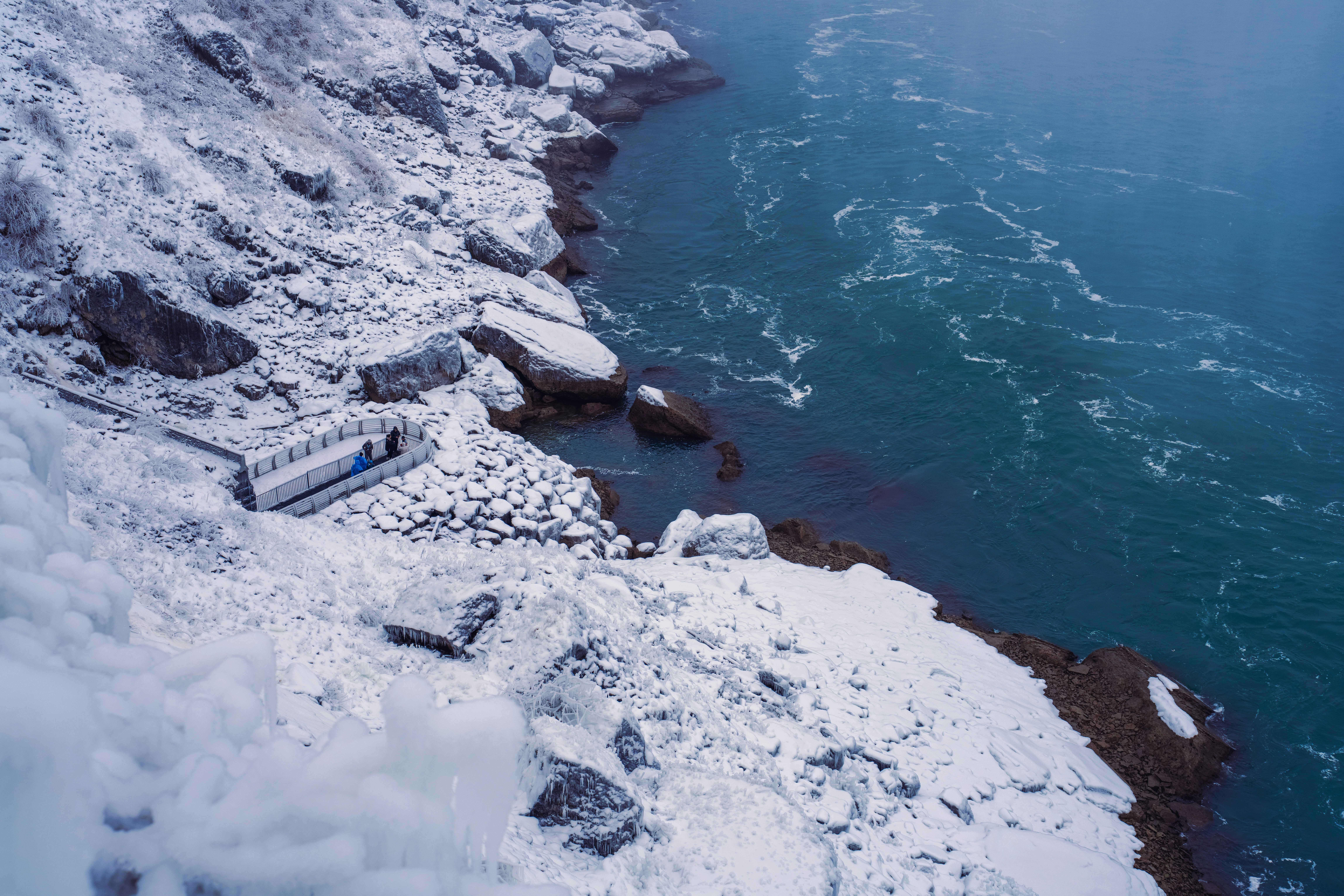 Icebound Veranda Over a Teal Seascape