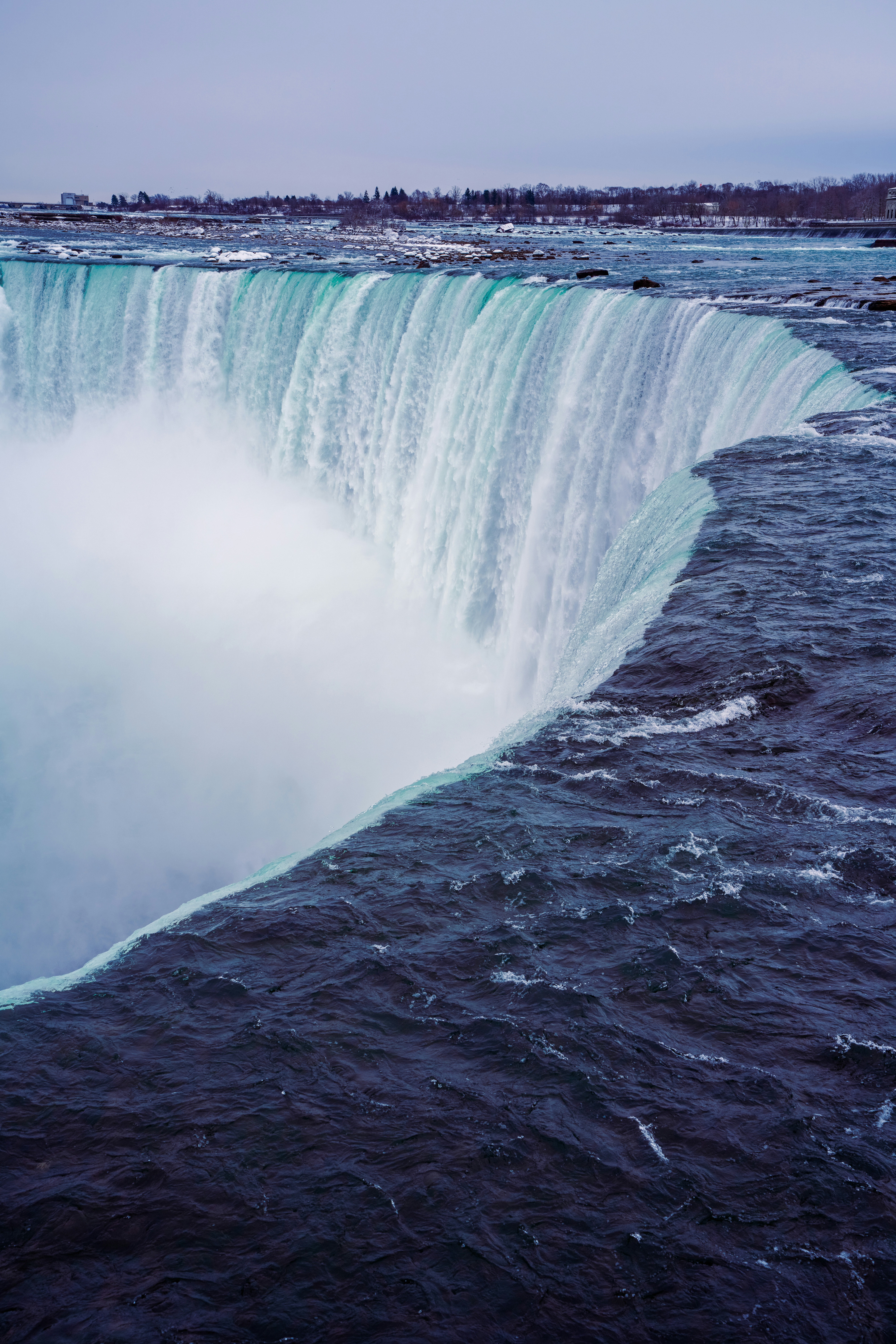 Niagara falls cascades powerfully over the edge. photo – Free Niagara ...