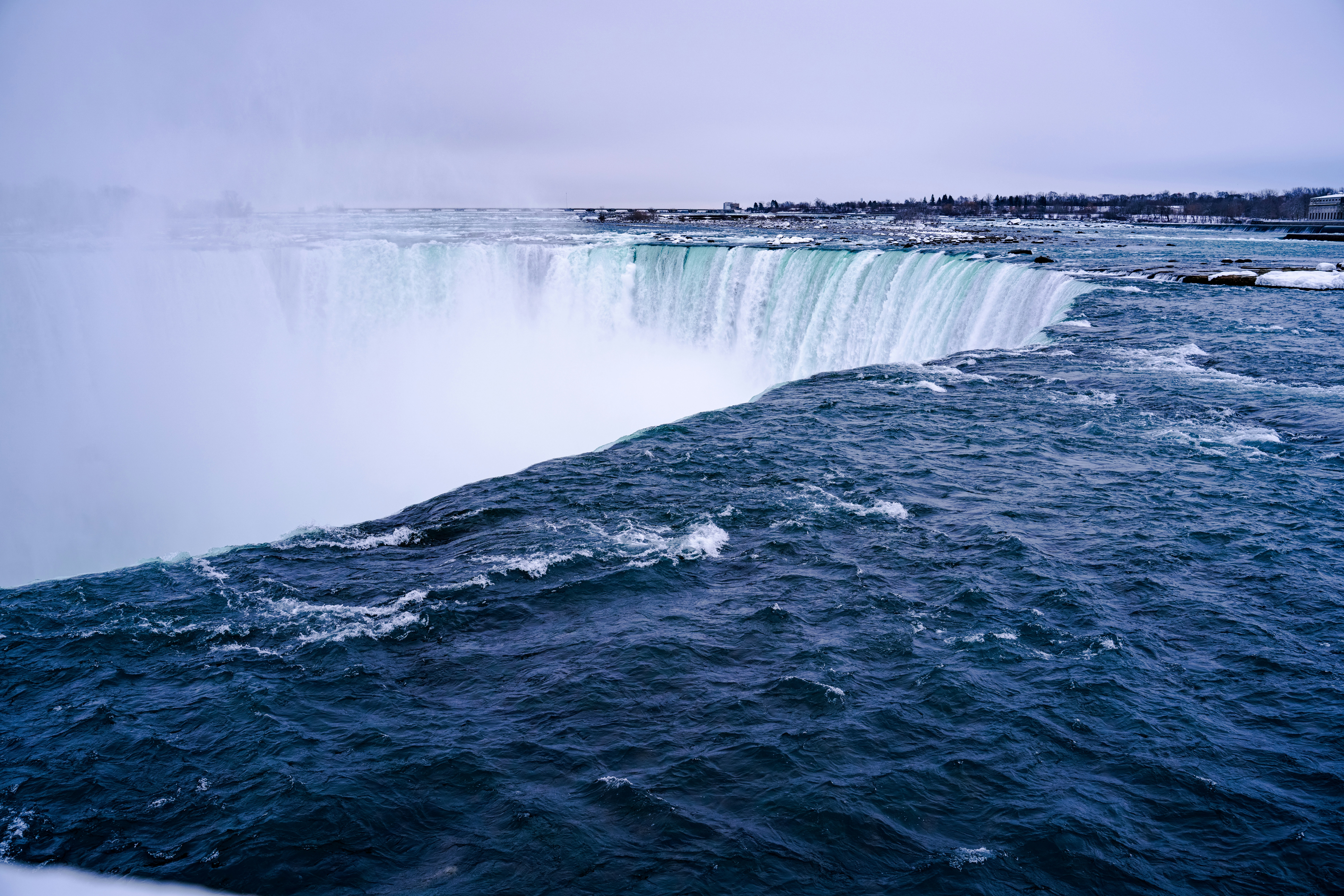 Niagara falls cascades powerfully into the water. photo – Free Niagara ...