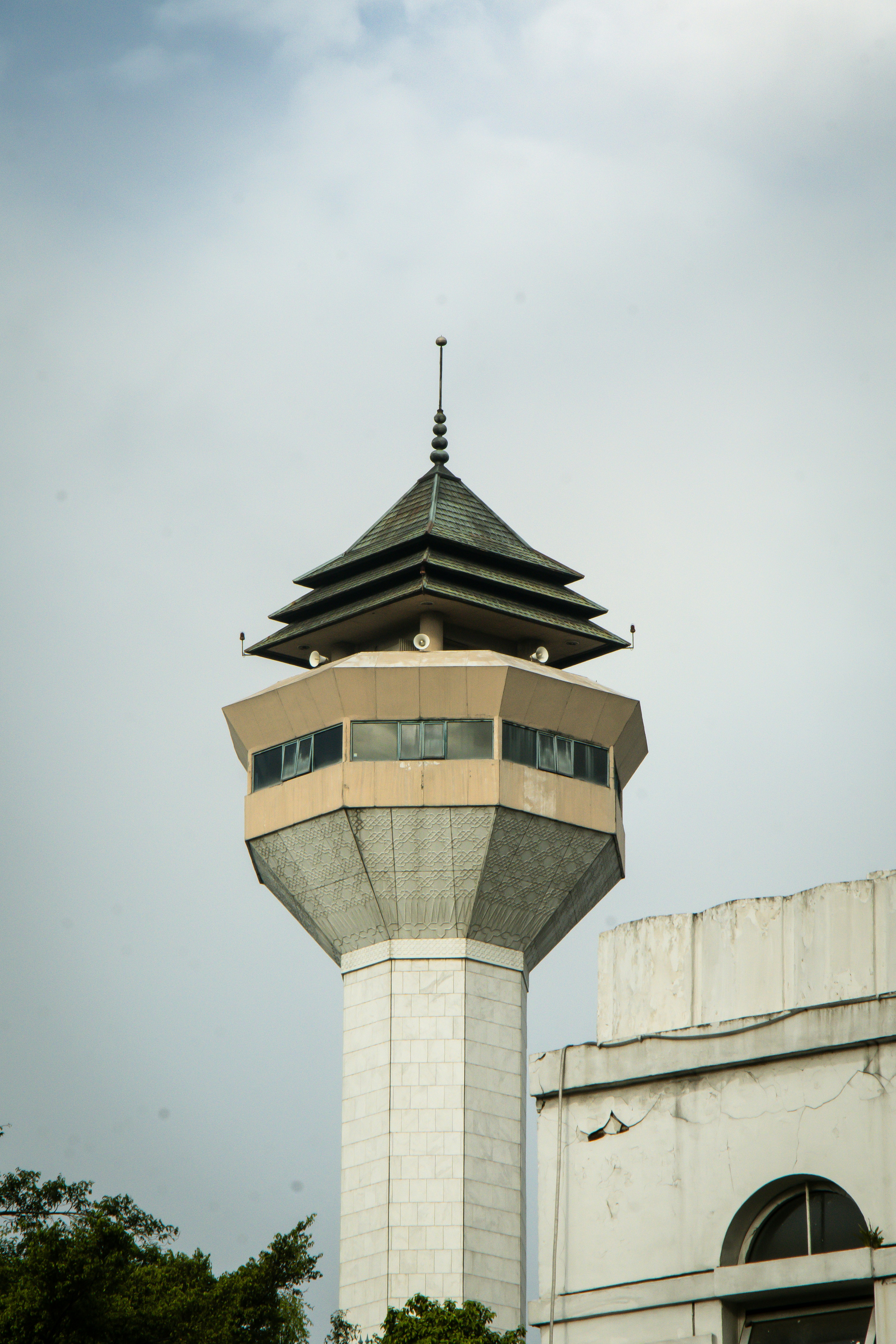 A tall tower with a unique, layered design. photo – Free Street ...