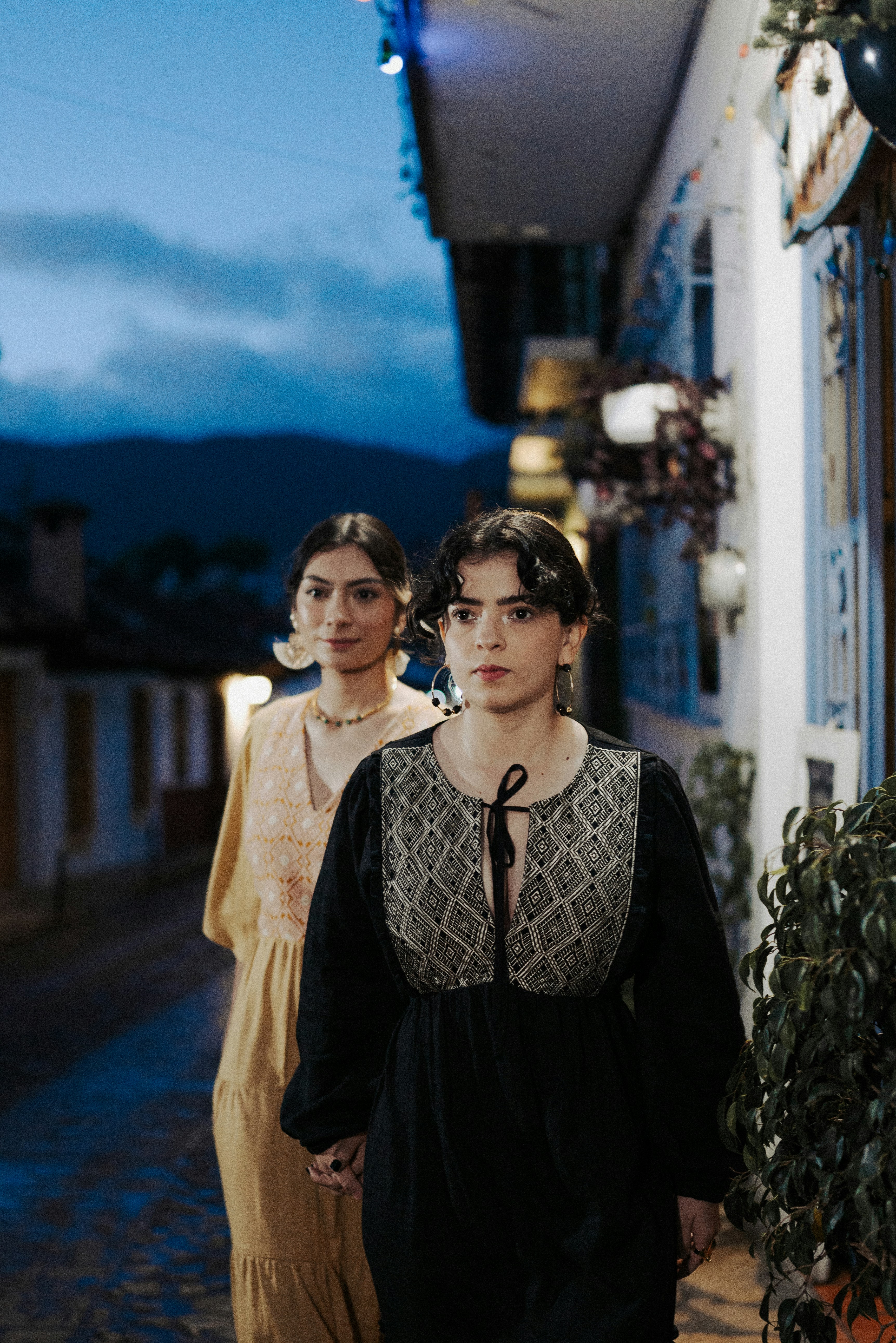 Blue Hour Stroll: The Black-Embroidered Dress Leads a Quiet Street Portrait