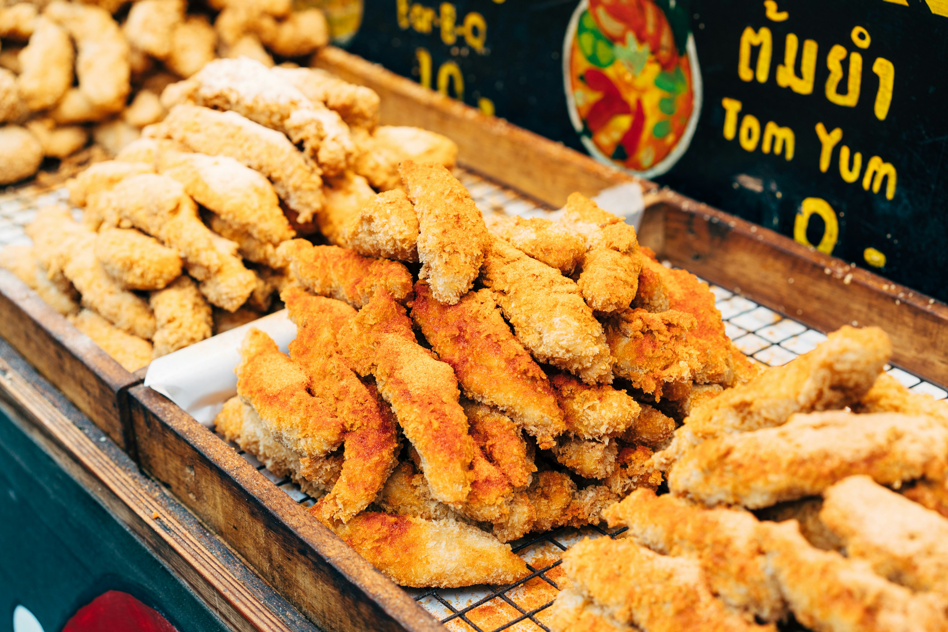 Fried food displayed on a counter at a market. photo – Free Food Image ...
