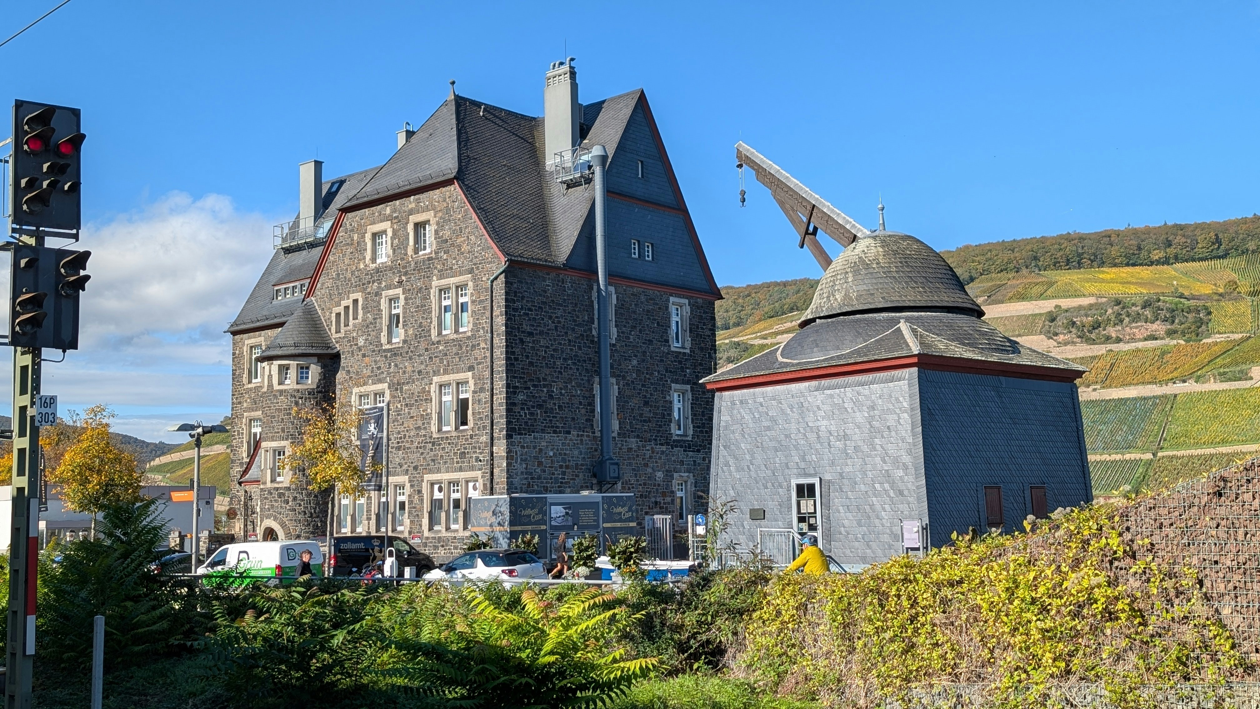 Stone Powerhouse by the Vineyard: A Retro Complex Standing Against Sloping Hills
