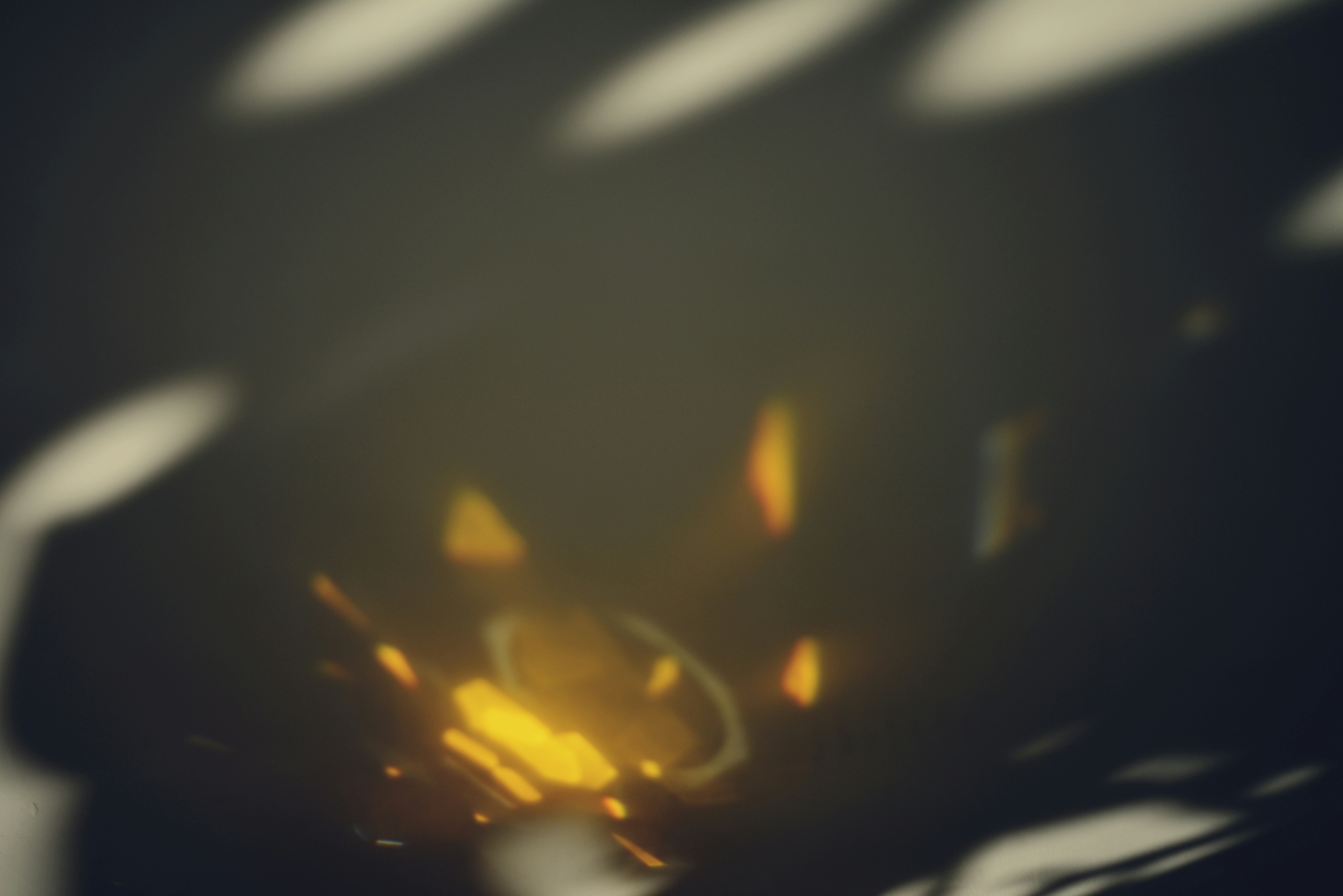 Sparks of light emerge from darkness. photo – Free Light Image on Unsplash