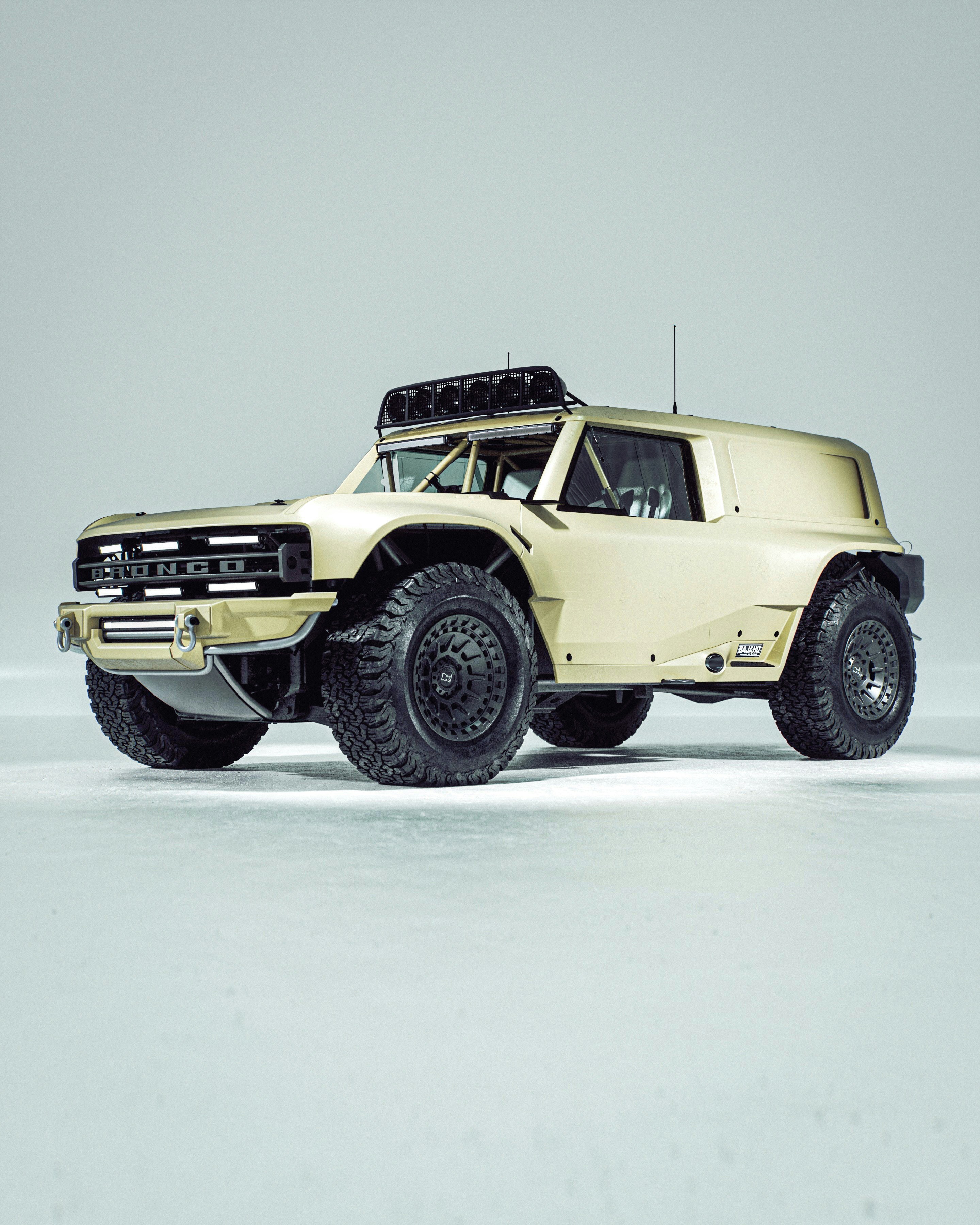A modified off-road vehicle in a studio setting. photo – Free Car Image ...