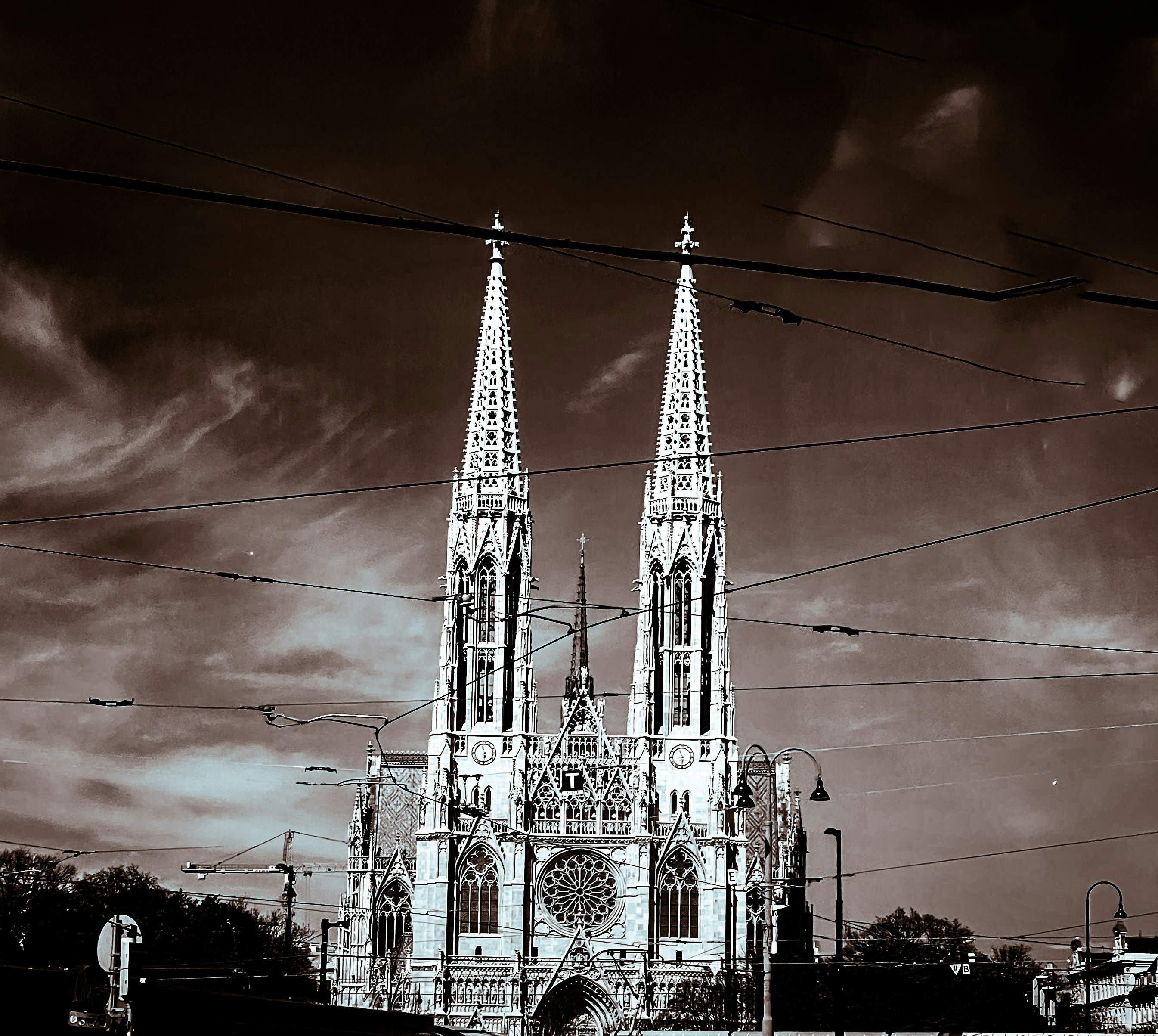 Two spires of a church tower over the sky. photo – Free Tower Image on ...
