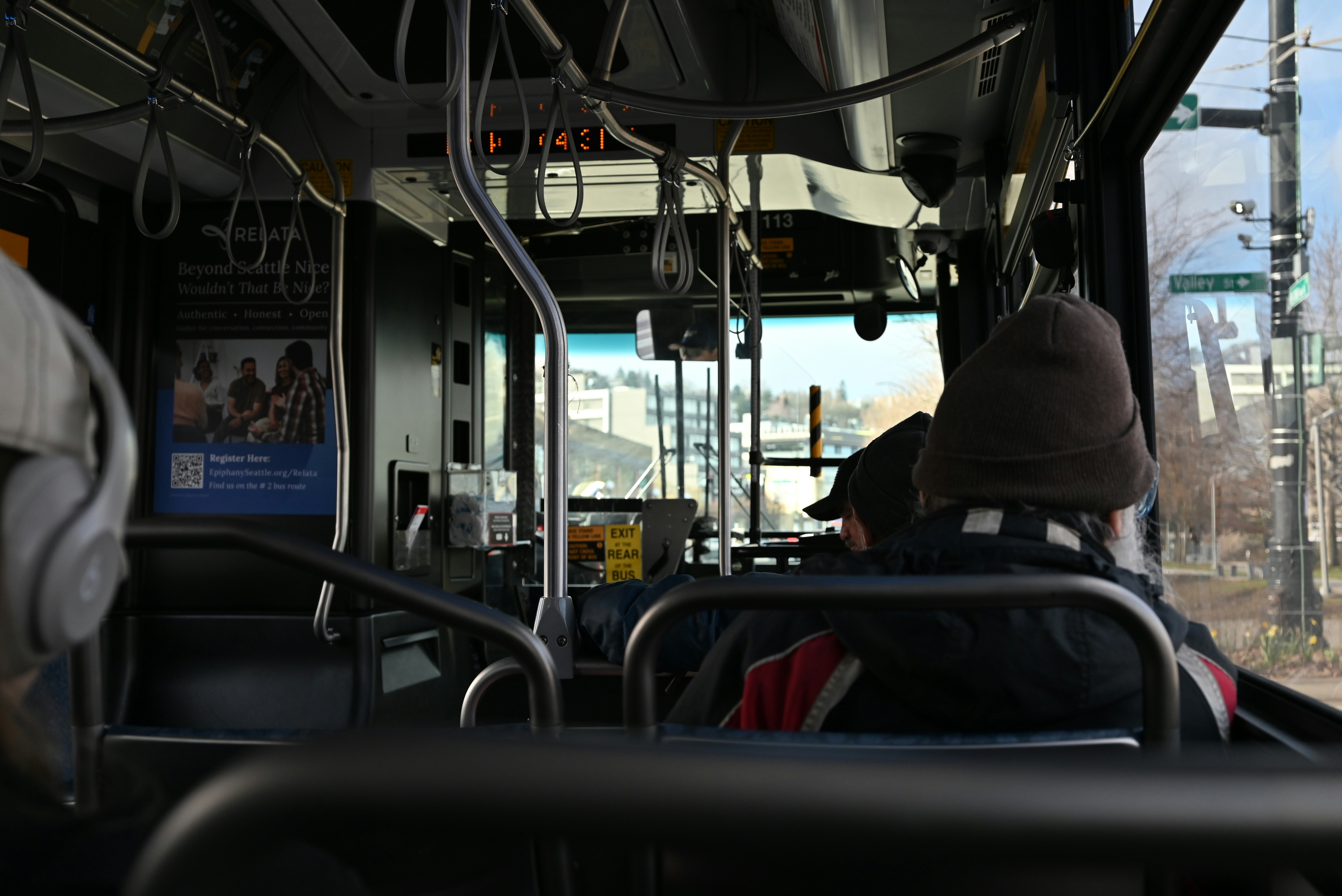Inside of a public bus with a few passengers. photo – Free People Image ...