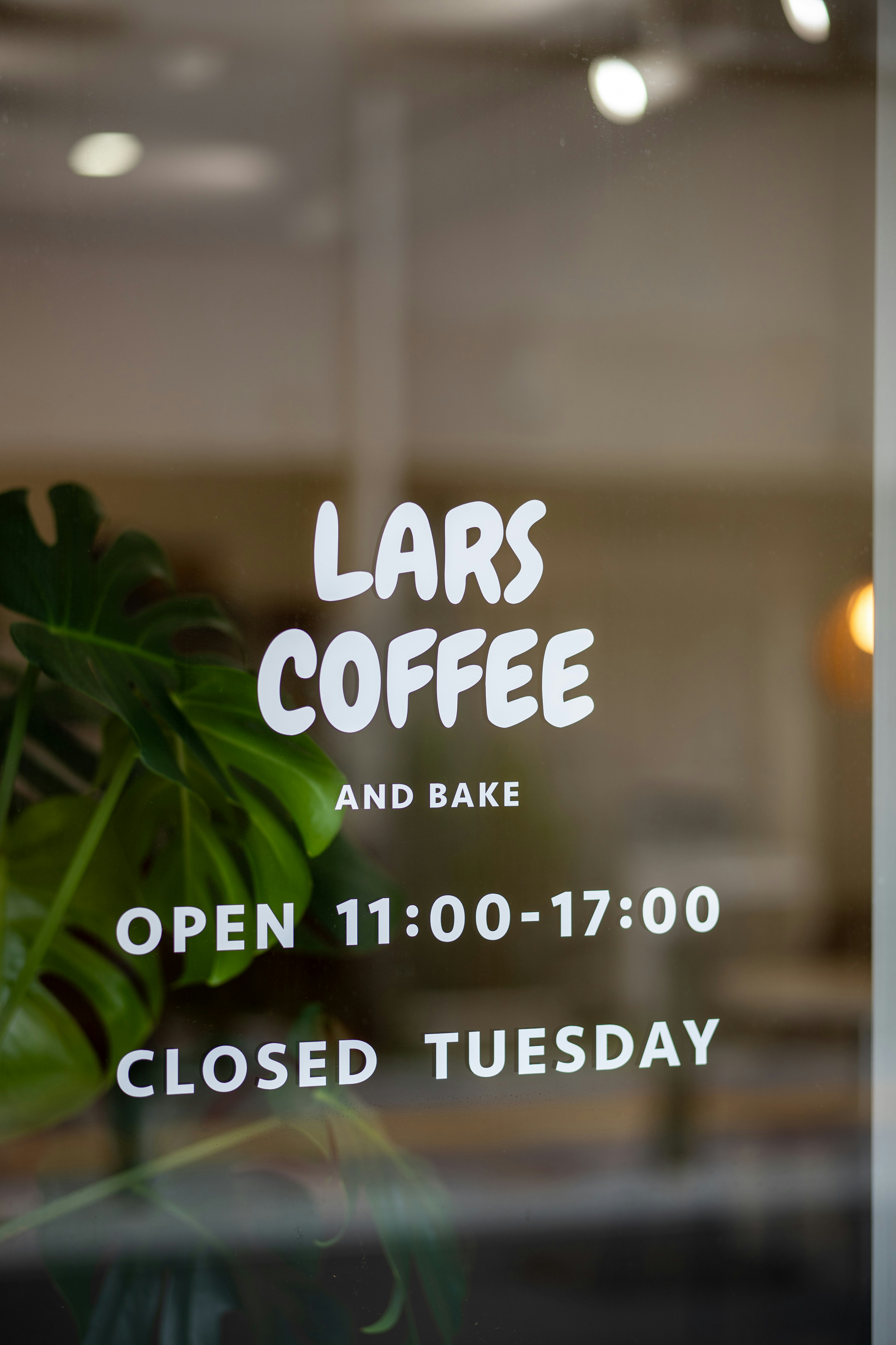 A coffee shop named lars is open with stated hours. photo – Free Plant ...