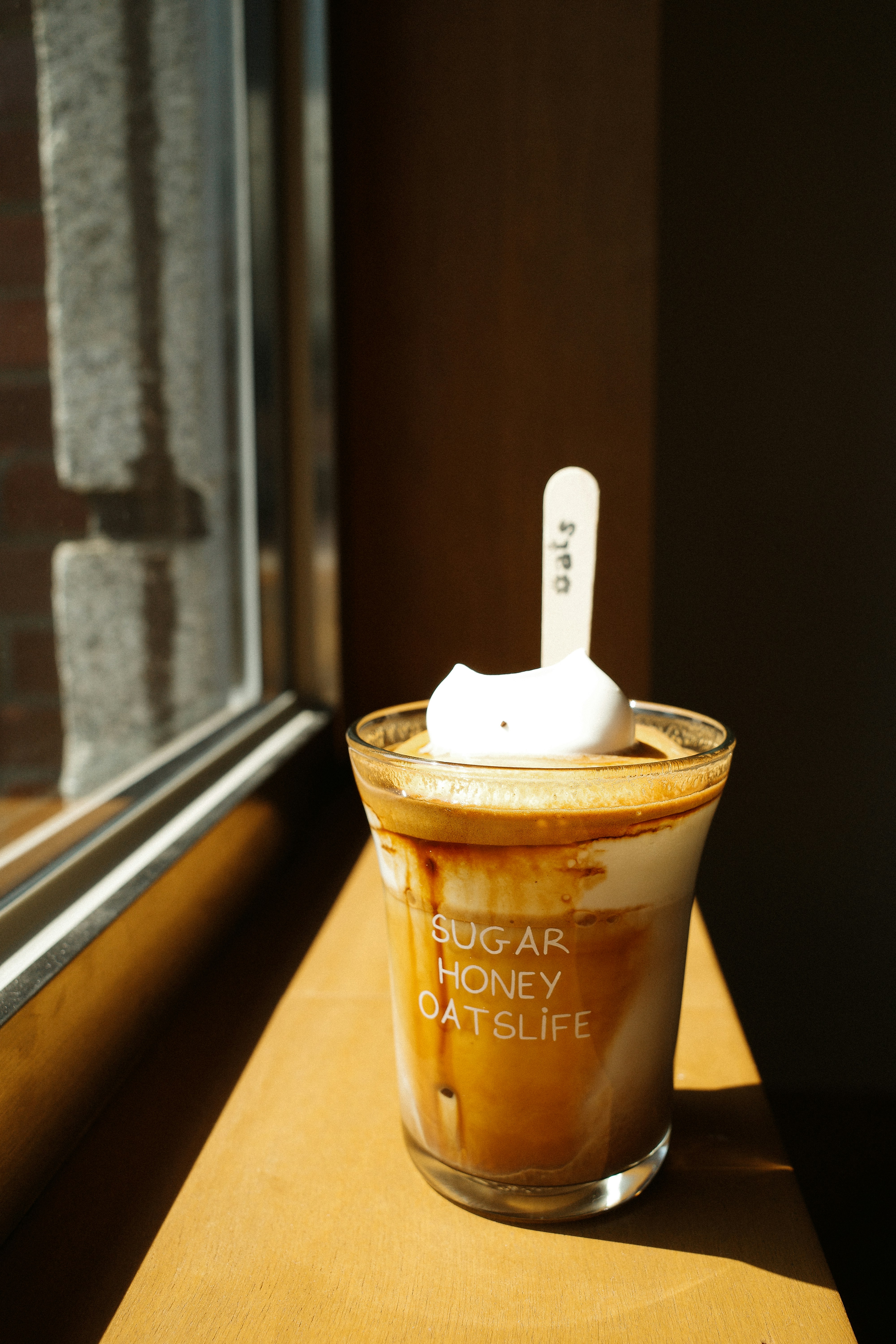 Sunlit Window Sill Iced Coffee with a Sugar Stick