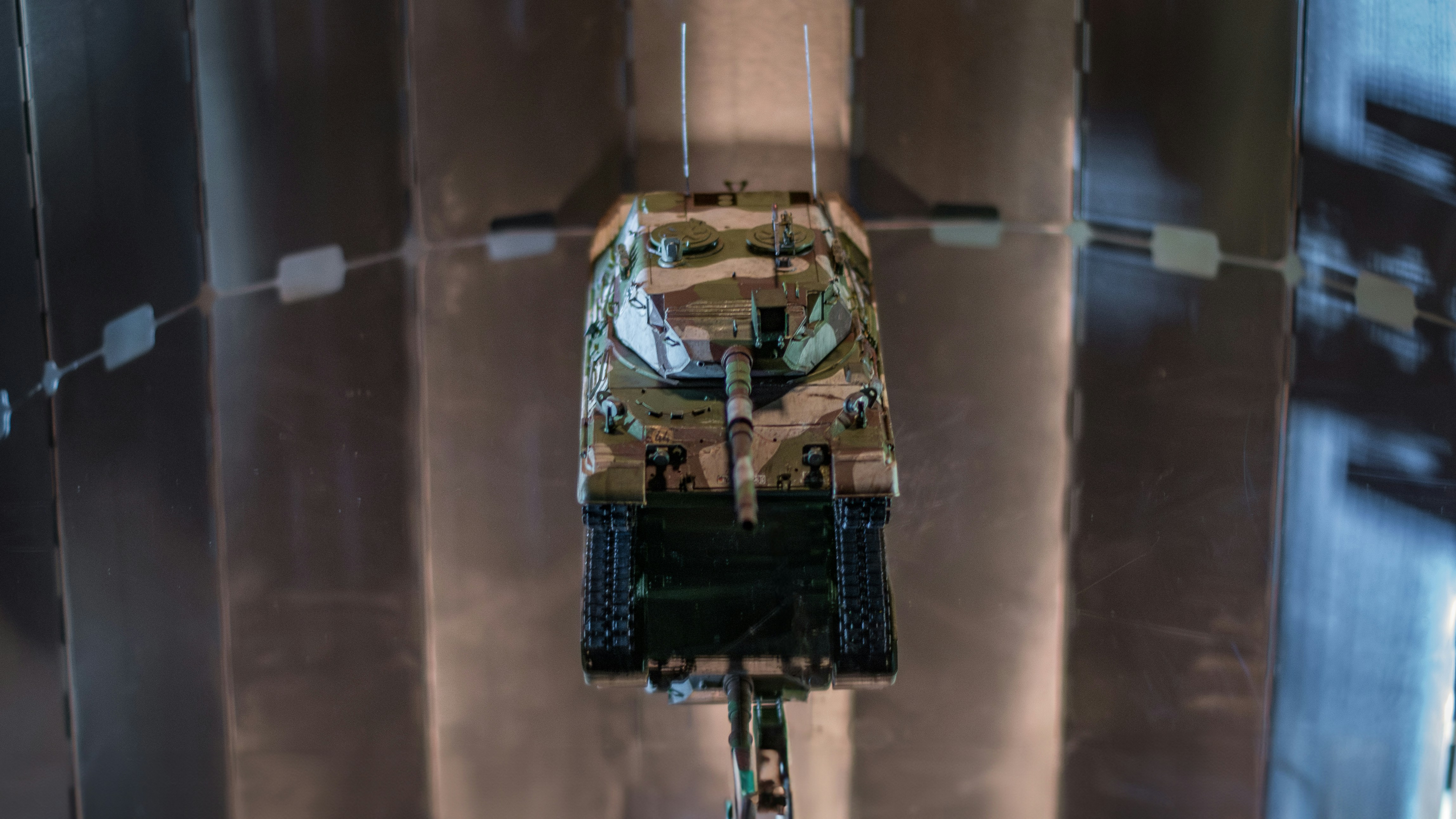 Detailed model of a German Leopard 1 tank with intricate camouflage details.