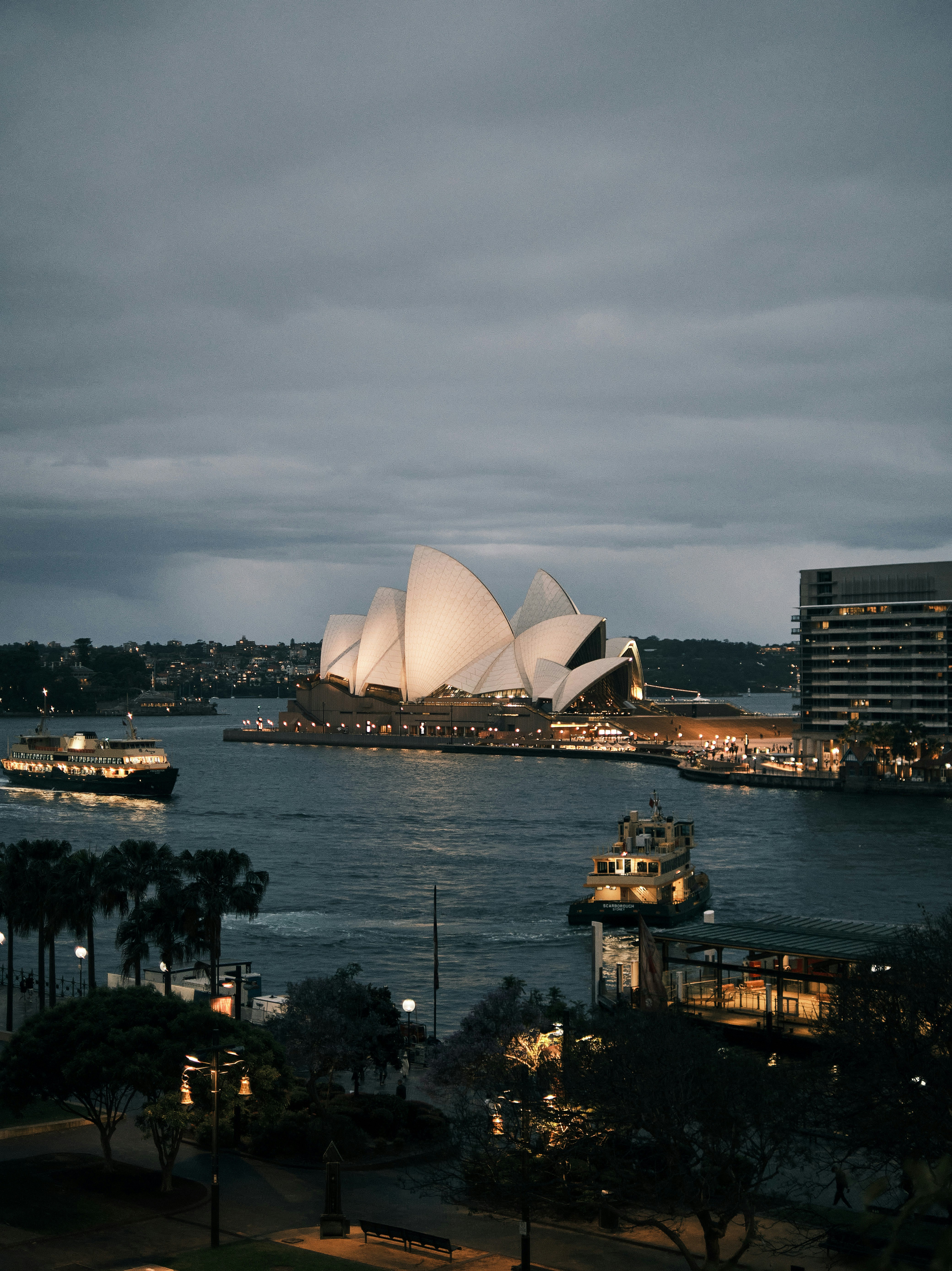 Evening Sails at Circular Quay: The Opera House in Soft Harbour Glow