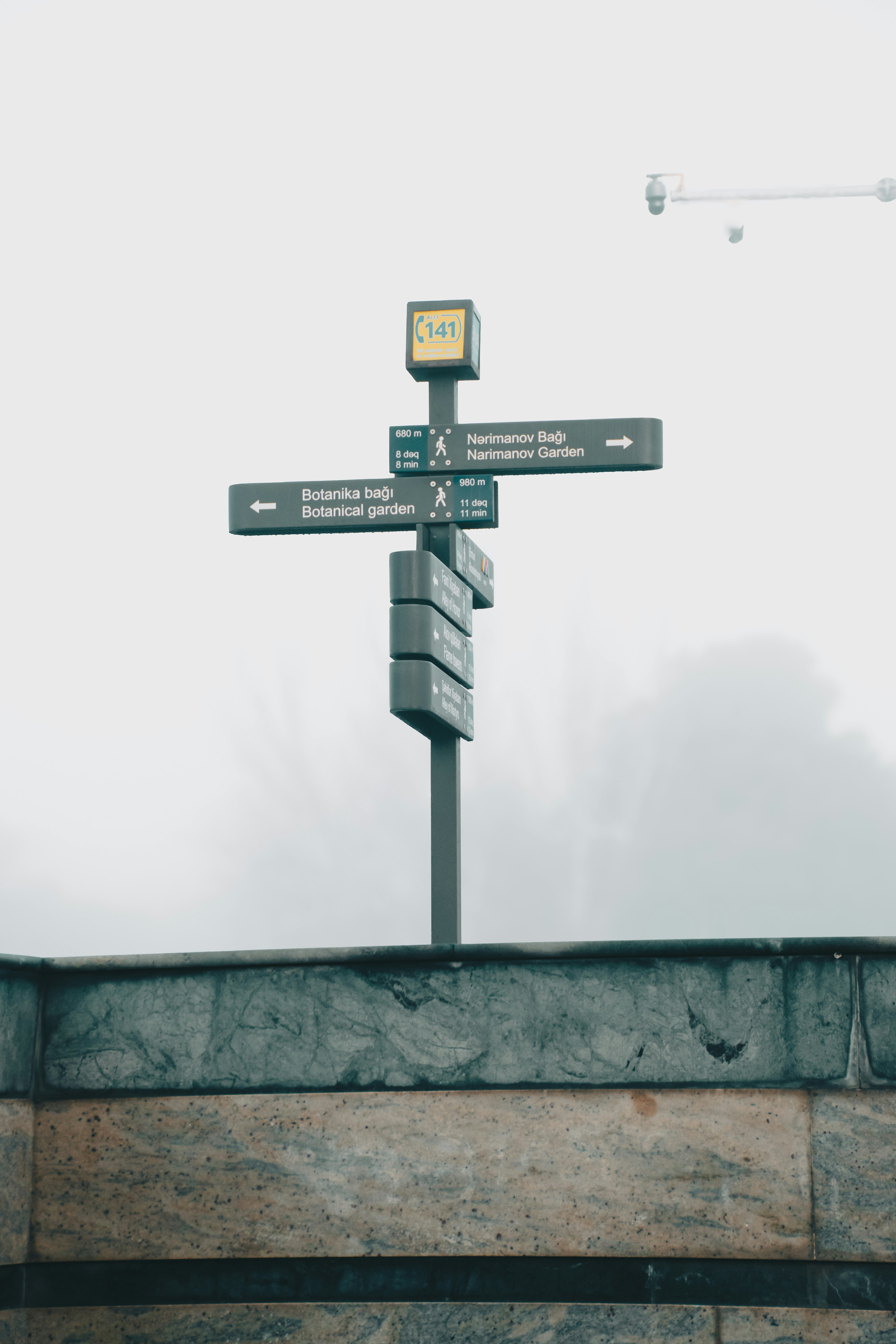 Directional signs point toward various destinations. photo – Free Baku ...