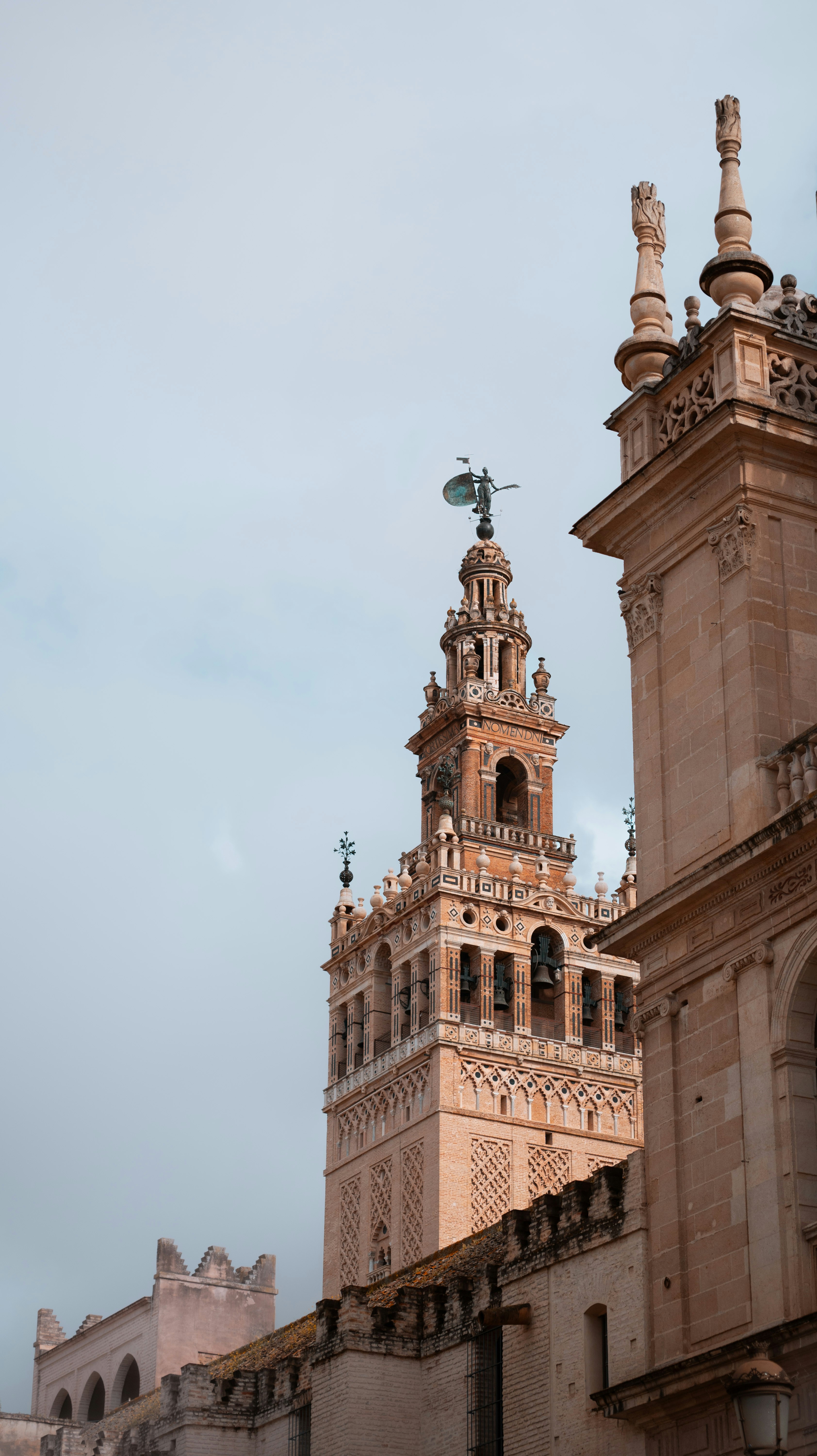 A tall, ornate tower reaches for the sky. photo – Free Spain Image on ...