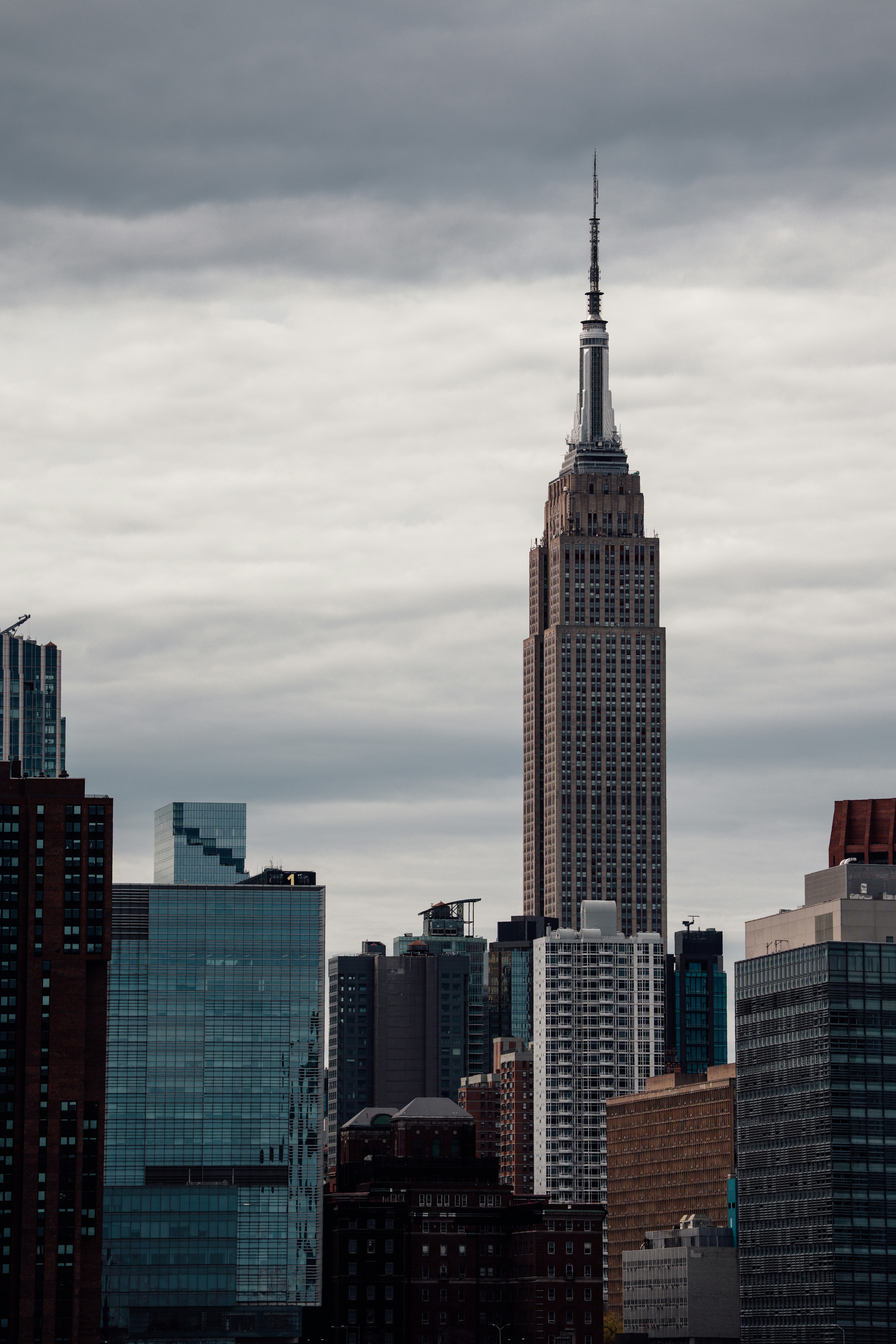 The empire state building stands tall in the skyline. photo – Free ...