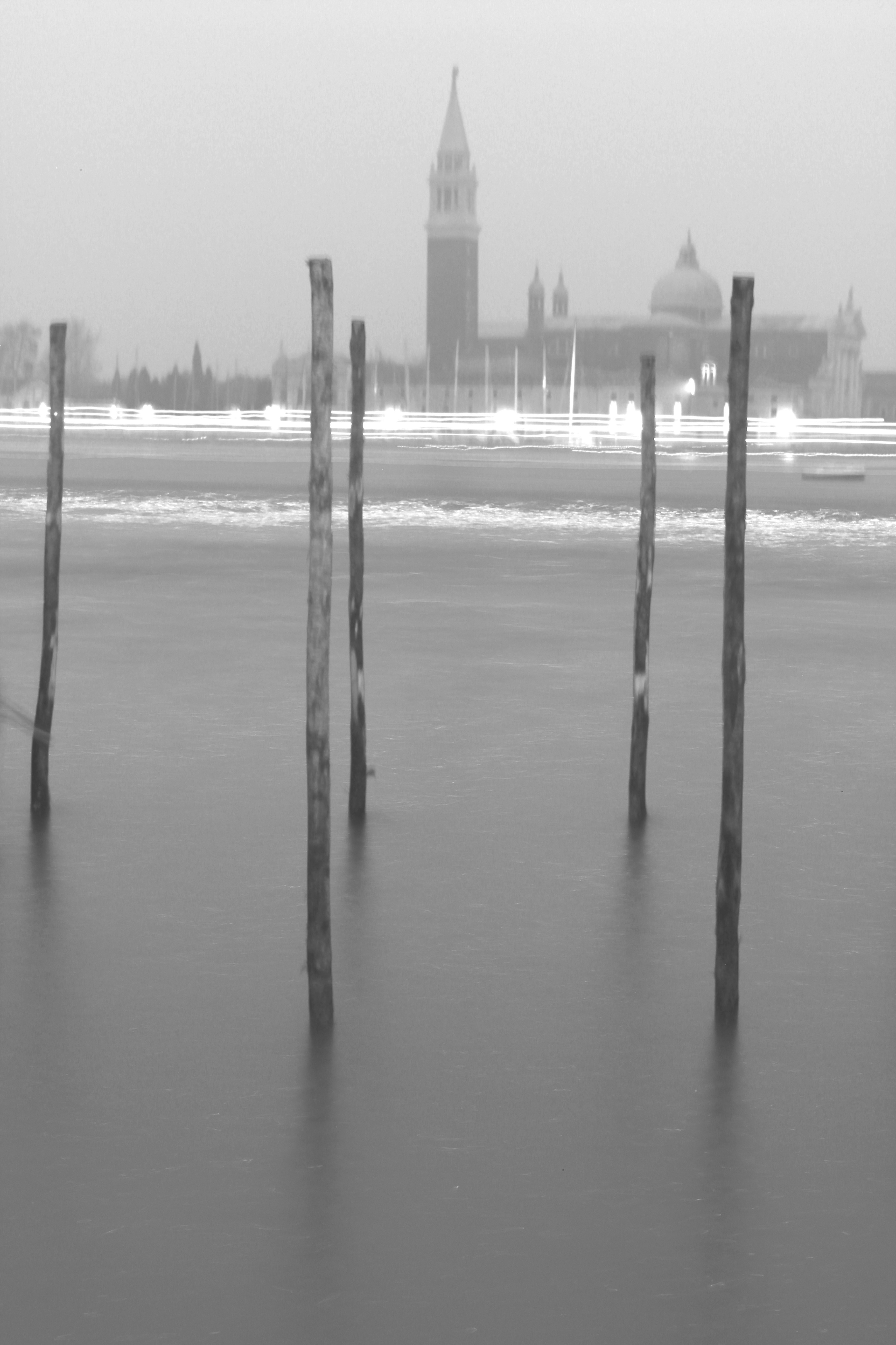 Venice's Quiet Horizon: Campanile and Domes in a Misty Light-Trail Skyline